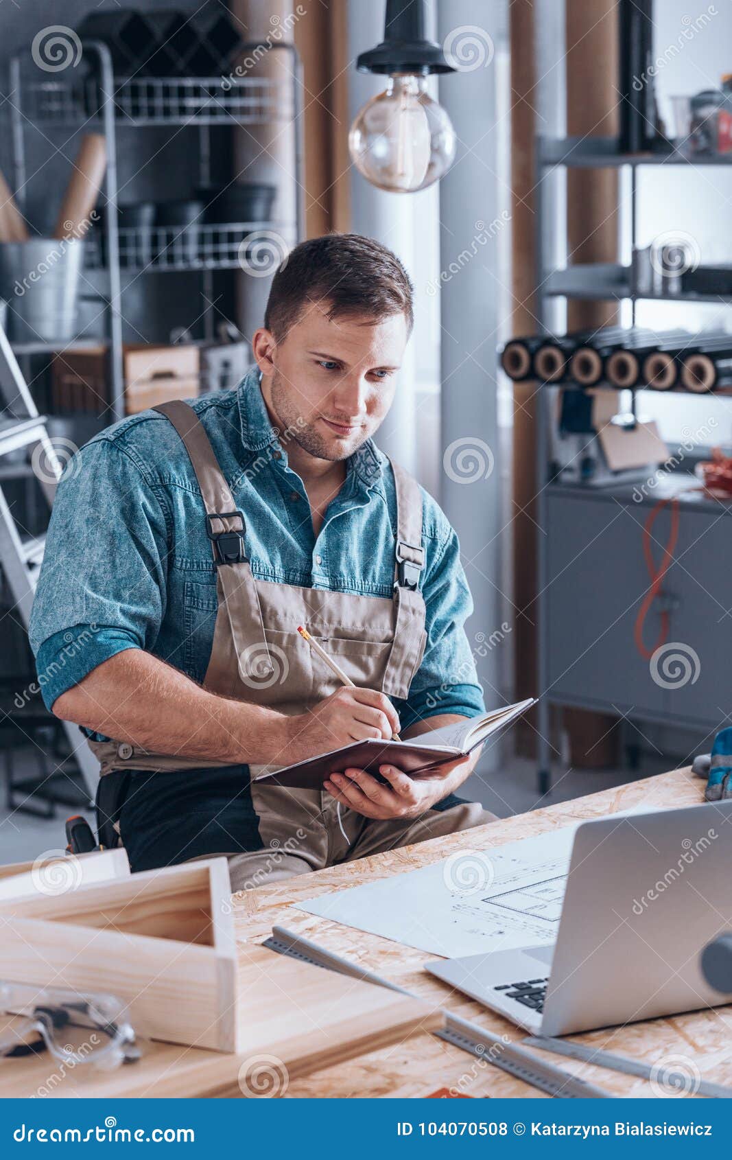 Young Carpenter Working Using Laptop Stock Photo - Image of laptop ...