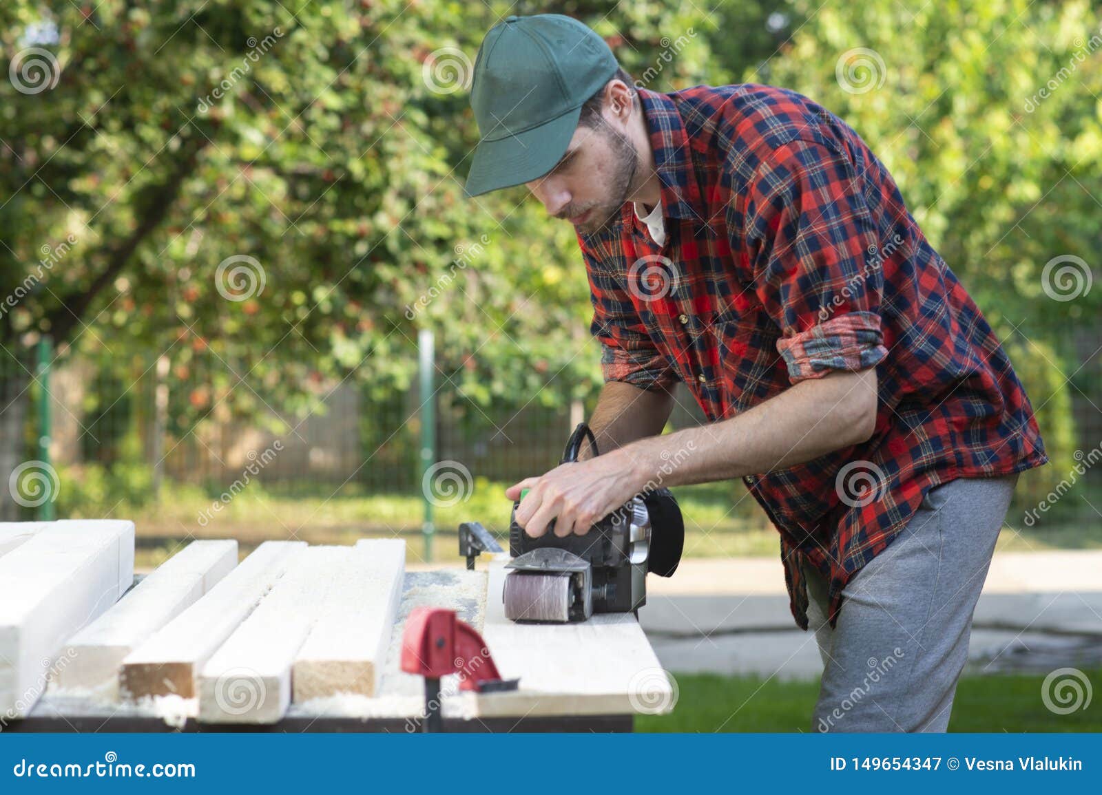 Young Carpenter Works with Electrical Planer Stock Image - Image of ...