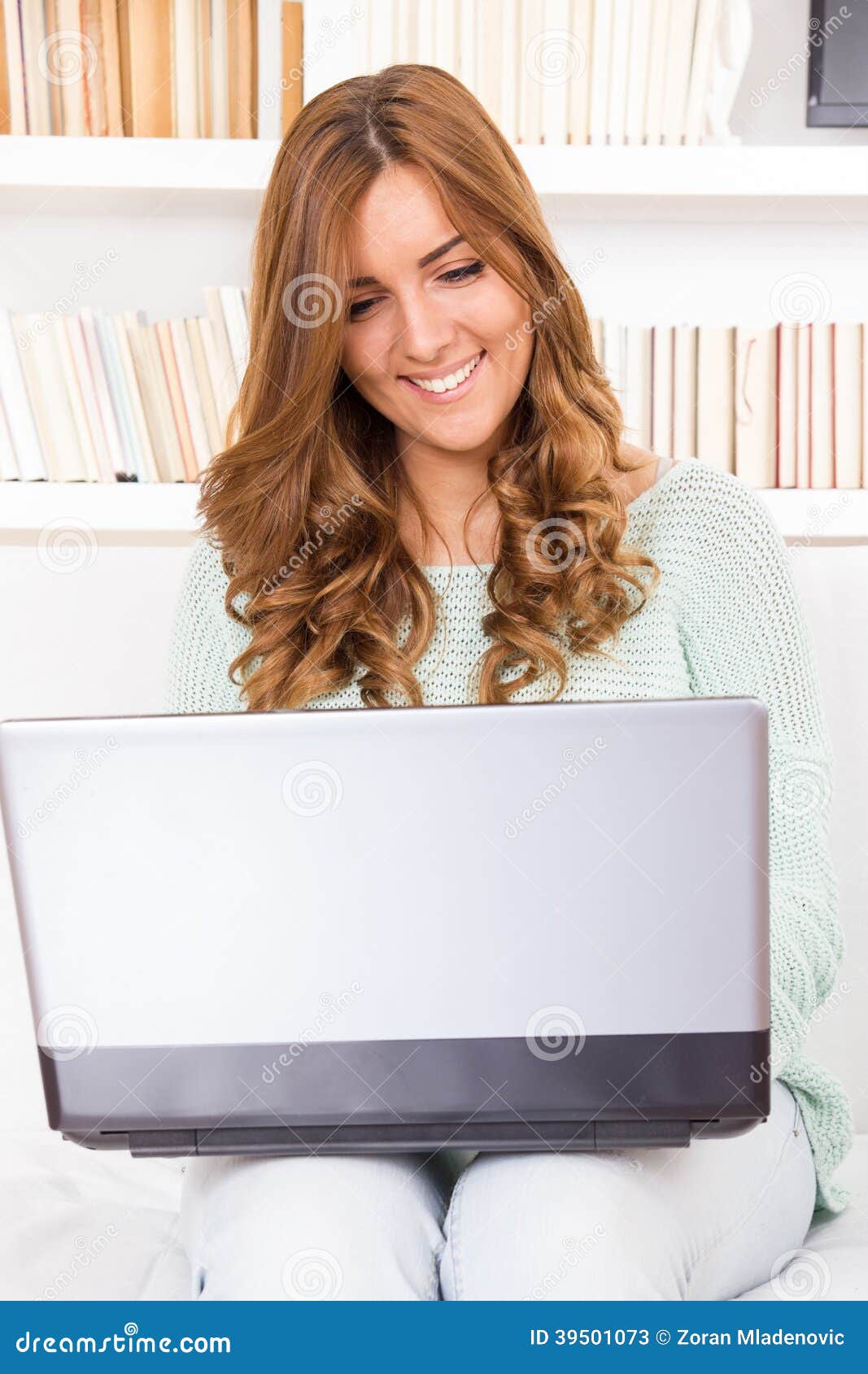 Young Casual Beautiful Woman Using a Laptop Computer at Home Stock ...