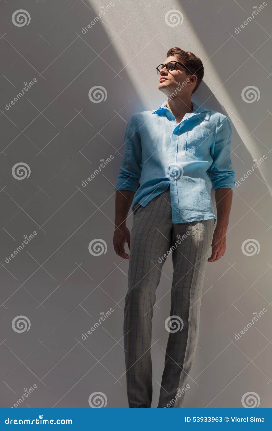 Young Casual Handsome Man Leaning on a Wall Stock Image - Image of ...