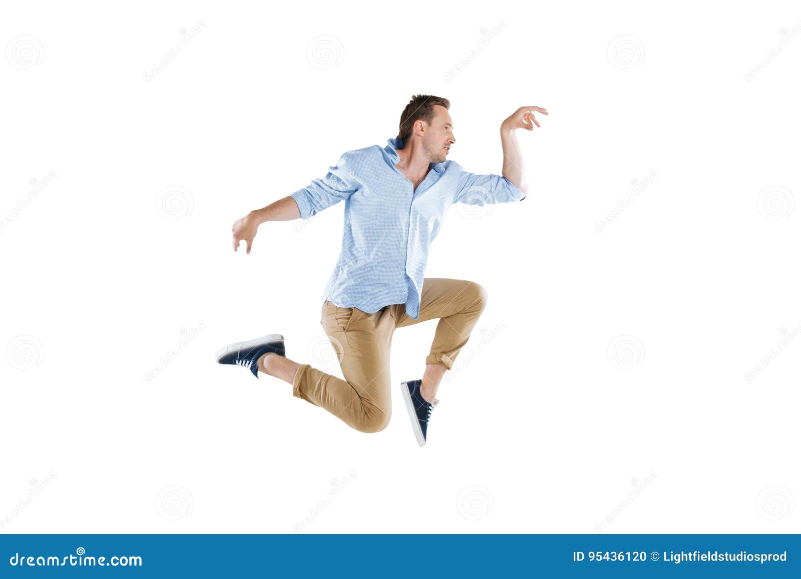 Young Casual Man Jumping with Funny Expression Stock Photo - Image of ...