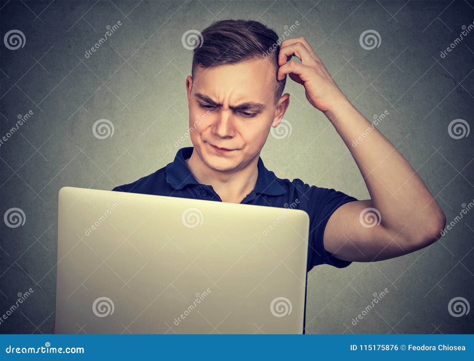 Confused Young Man with Laptop Stock Photo - Image of forget ...