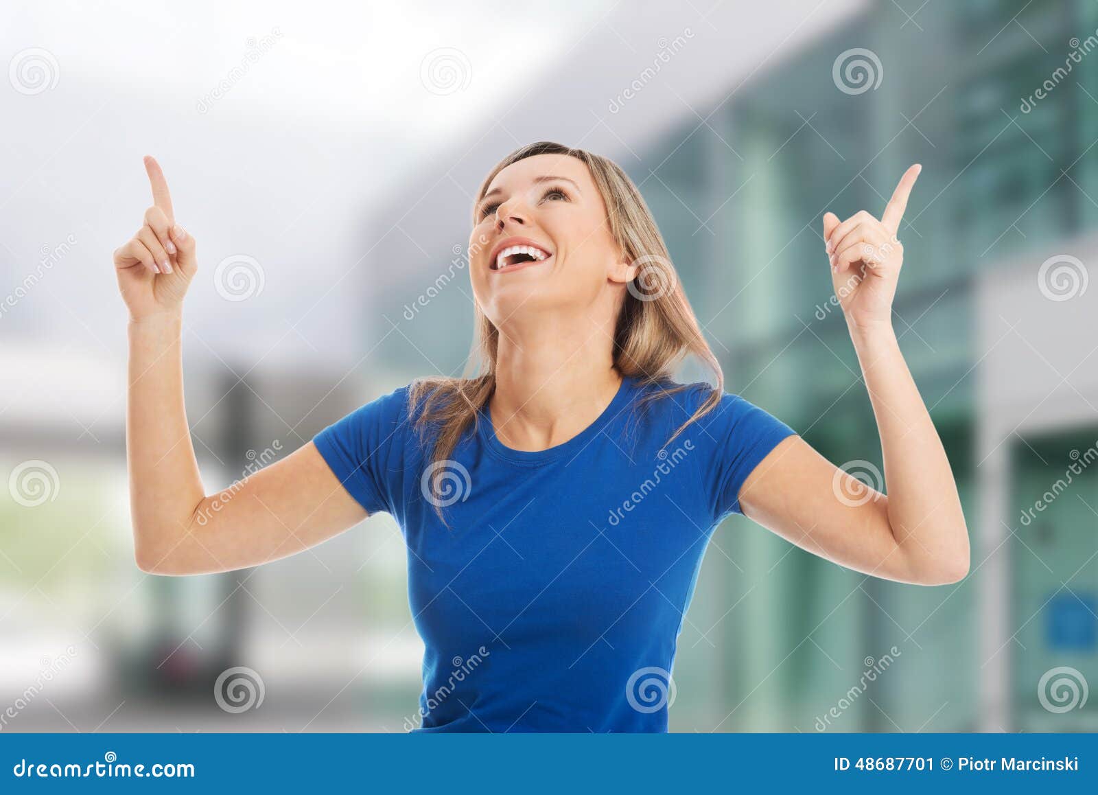 Young Casual Woman Pointing Up. Stock Image - Image of business ...