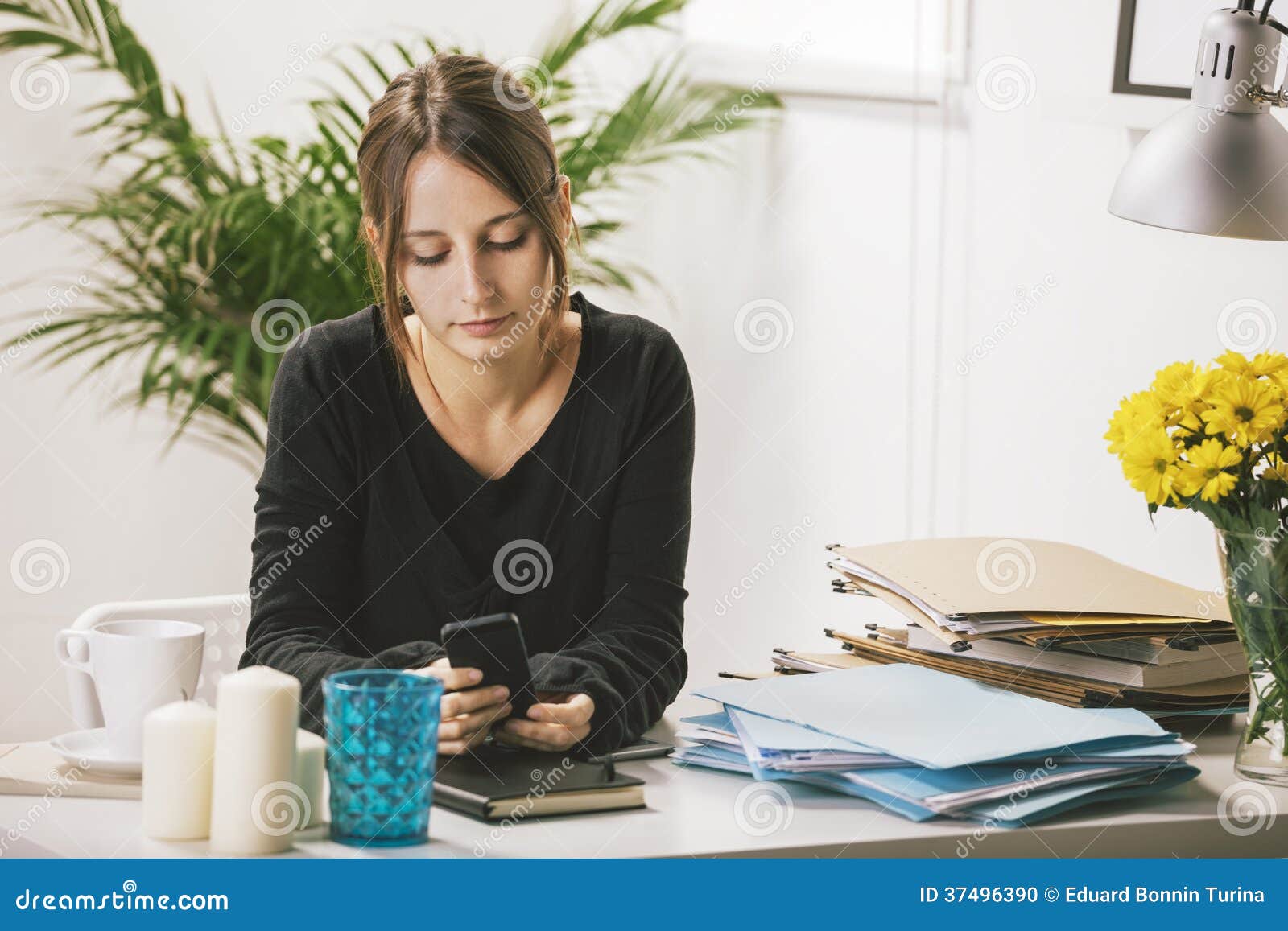 Young Casual Woman Using Smartphone in Office. Stock Photo - Image of ...