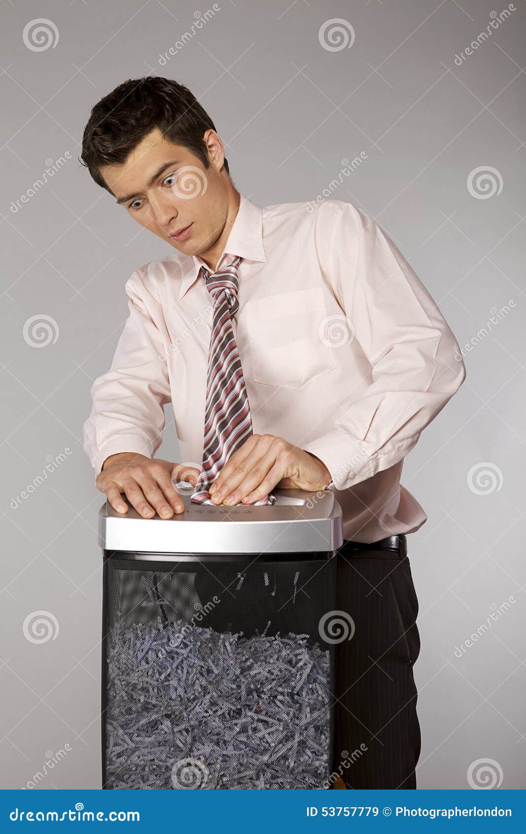 Young Caucasian Businessman with Tie Trapped in Shredded Machine Stock ...