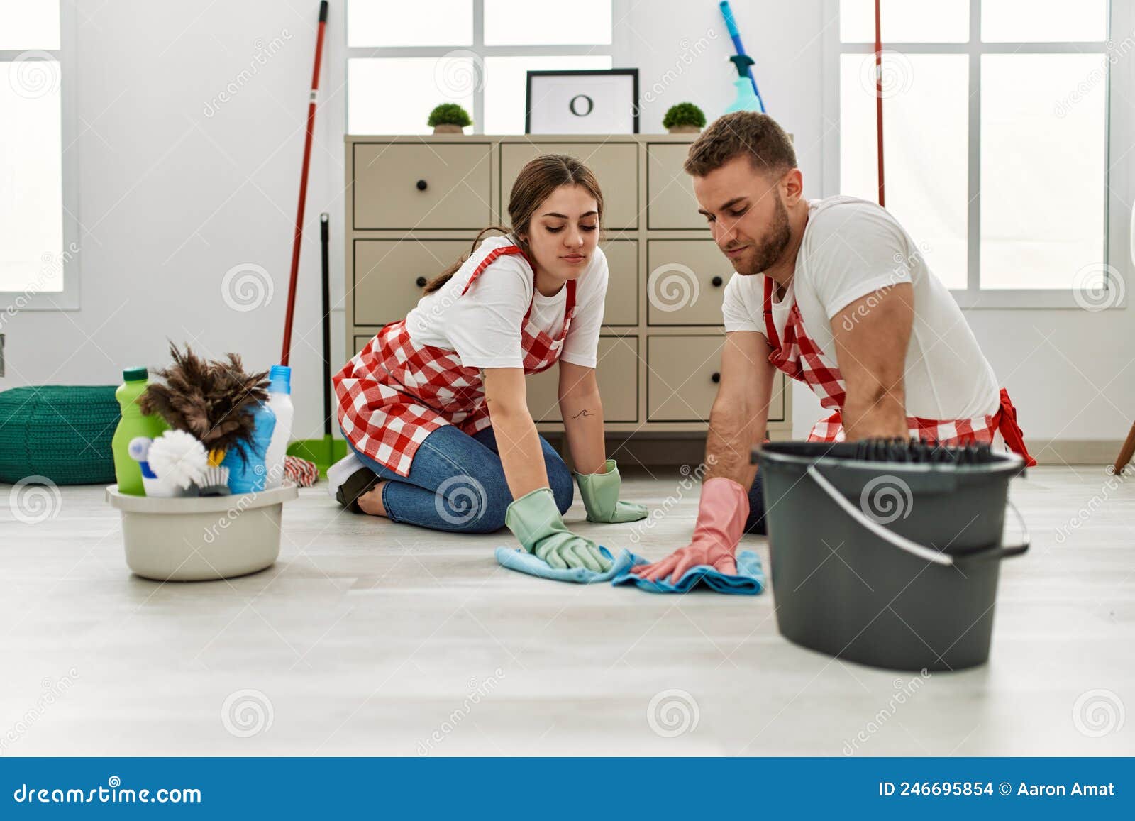Young Caucasian Couple Washing Floor Using Rag at Home Stock Photo ...