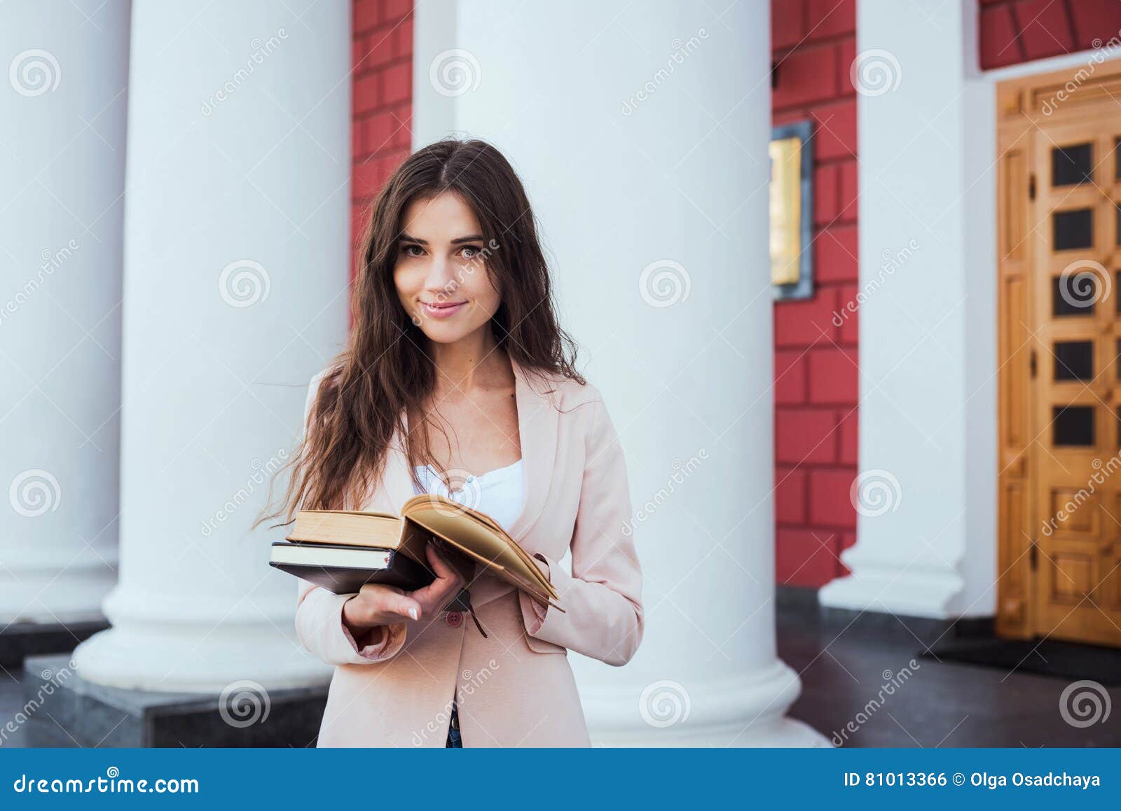 Young Caucasian Female Student with Books on Campus Stock Photo - Image ...