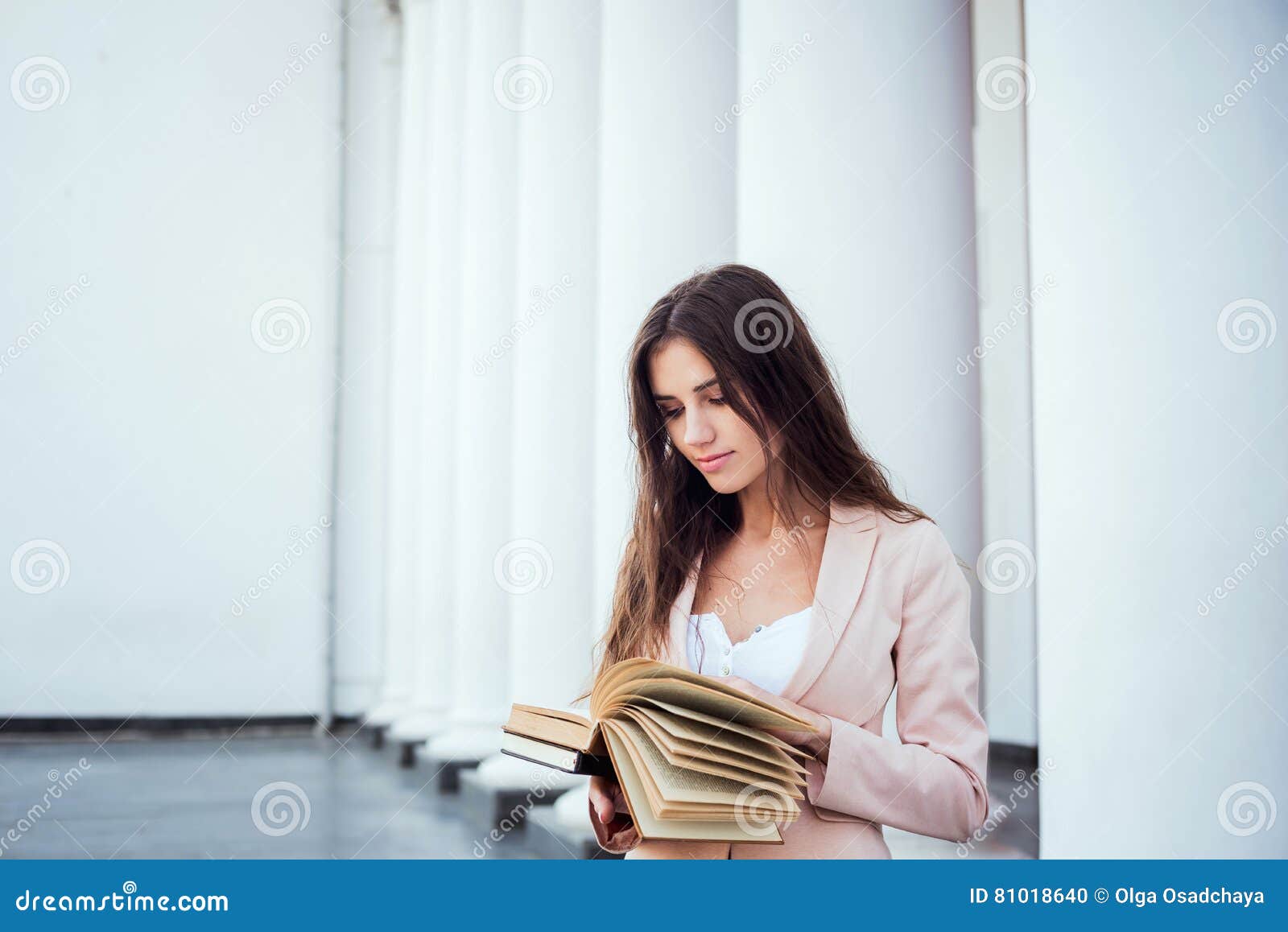Young Caucasian Female Student with Books on Campus Stock Photo - Image ...