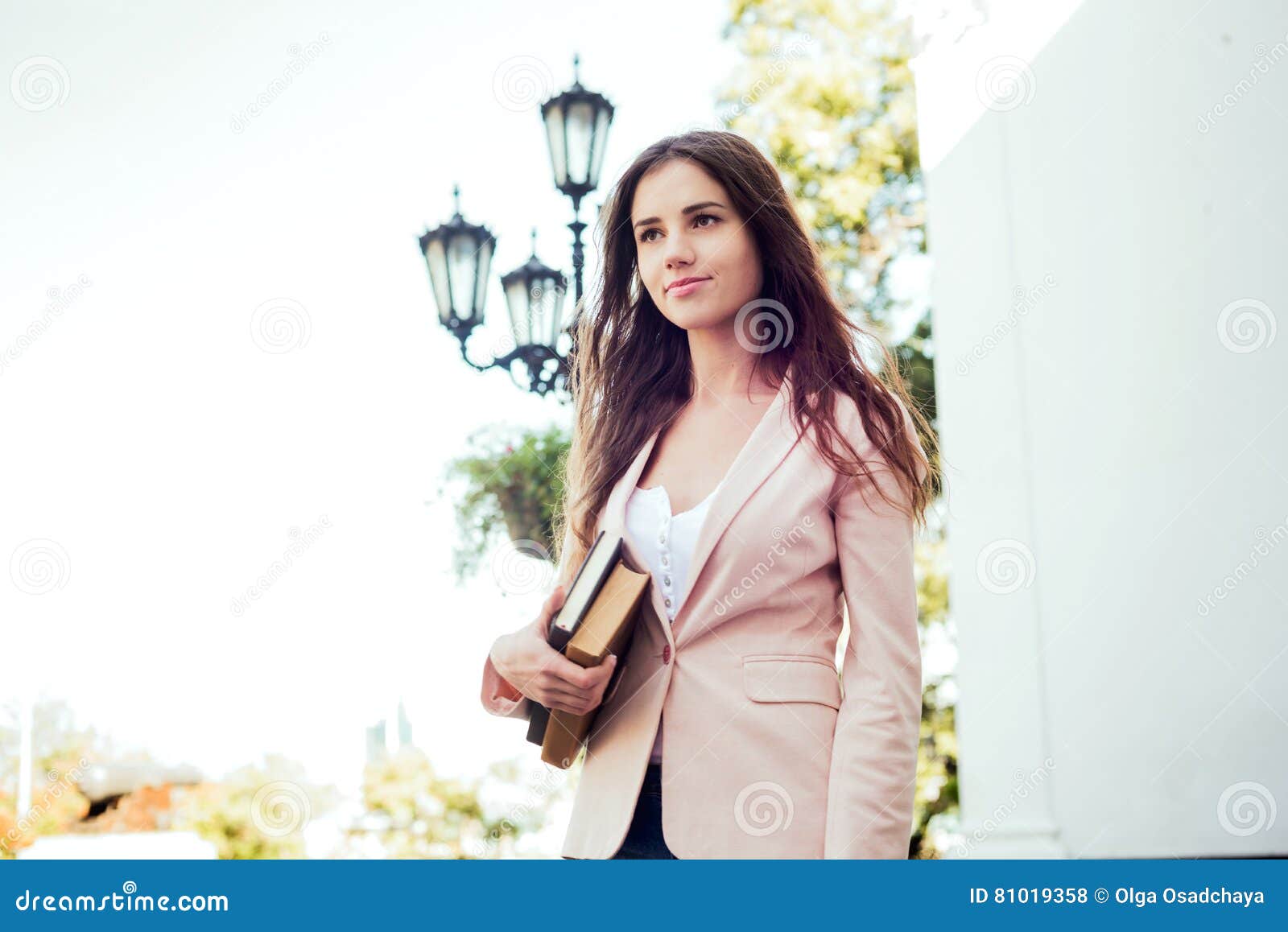 Young Caucasian Female Student with Books on Campus Stock Photo - Image ...