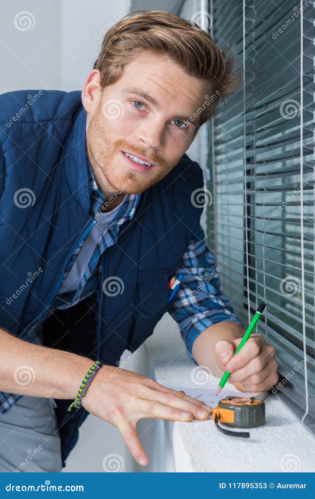 Young Caucasian Handsome Smiling Man Taking Notes before Action Stock ... Young Caucasian Handsome Smiling Man Taking Notes before Action Stock ...