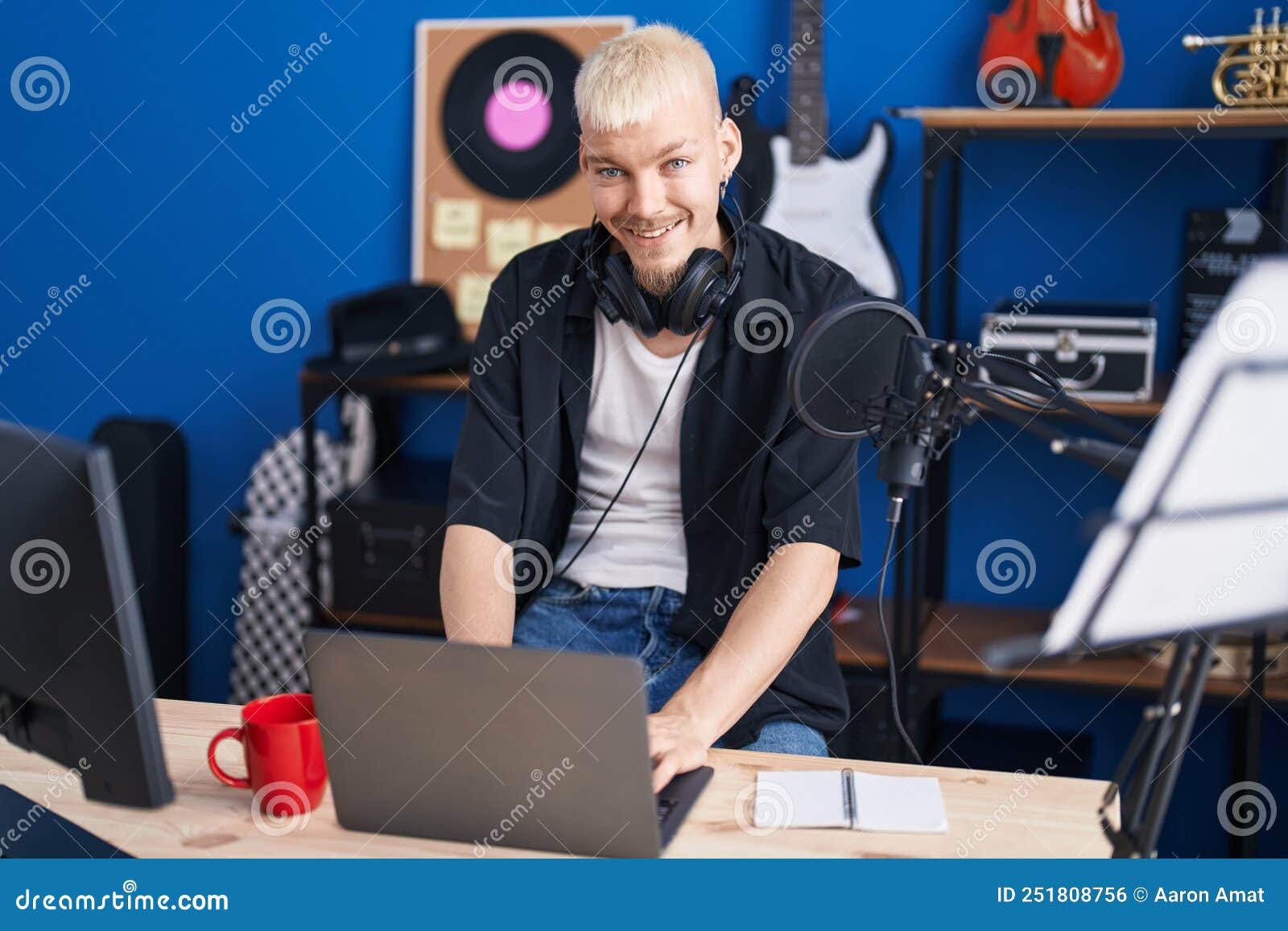 Young Caucasian Man Artist Using Laptop at Music Studio Stock Photo ...