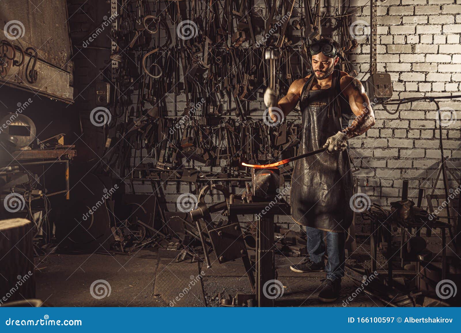 Young Caucasian Man Beating Hot Metal Stock Image - Image of craftsman ...