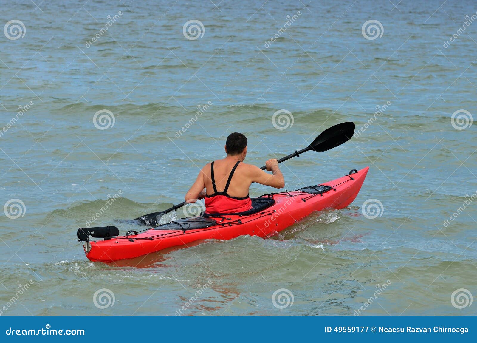 Young Caucasian Man Kayaking Stock Image - Image of kayaking, flower ...