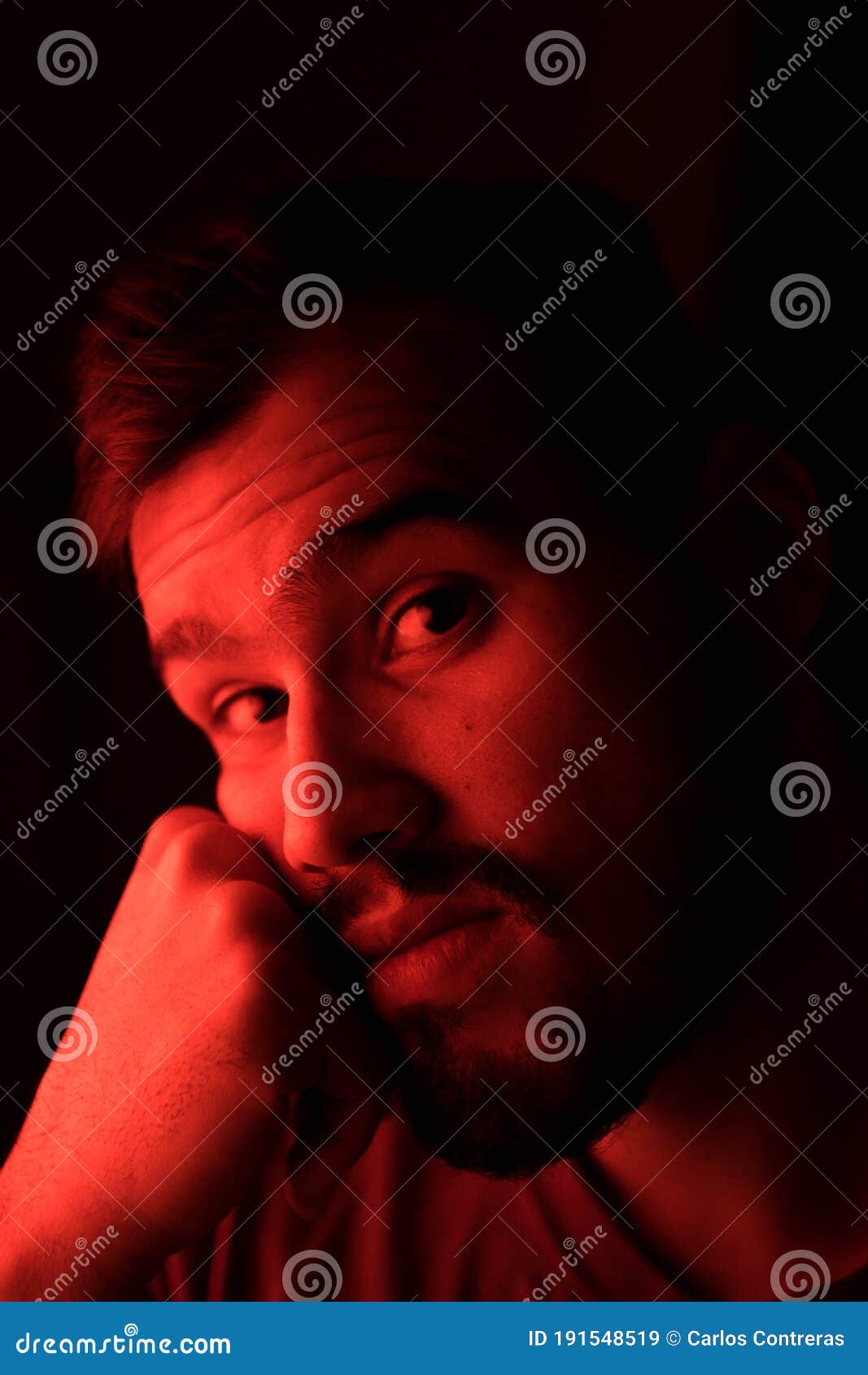 Young Caucasian Man with Red Light on His Face Stock Image - Image of ...
