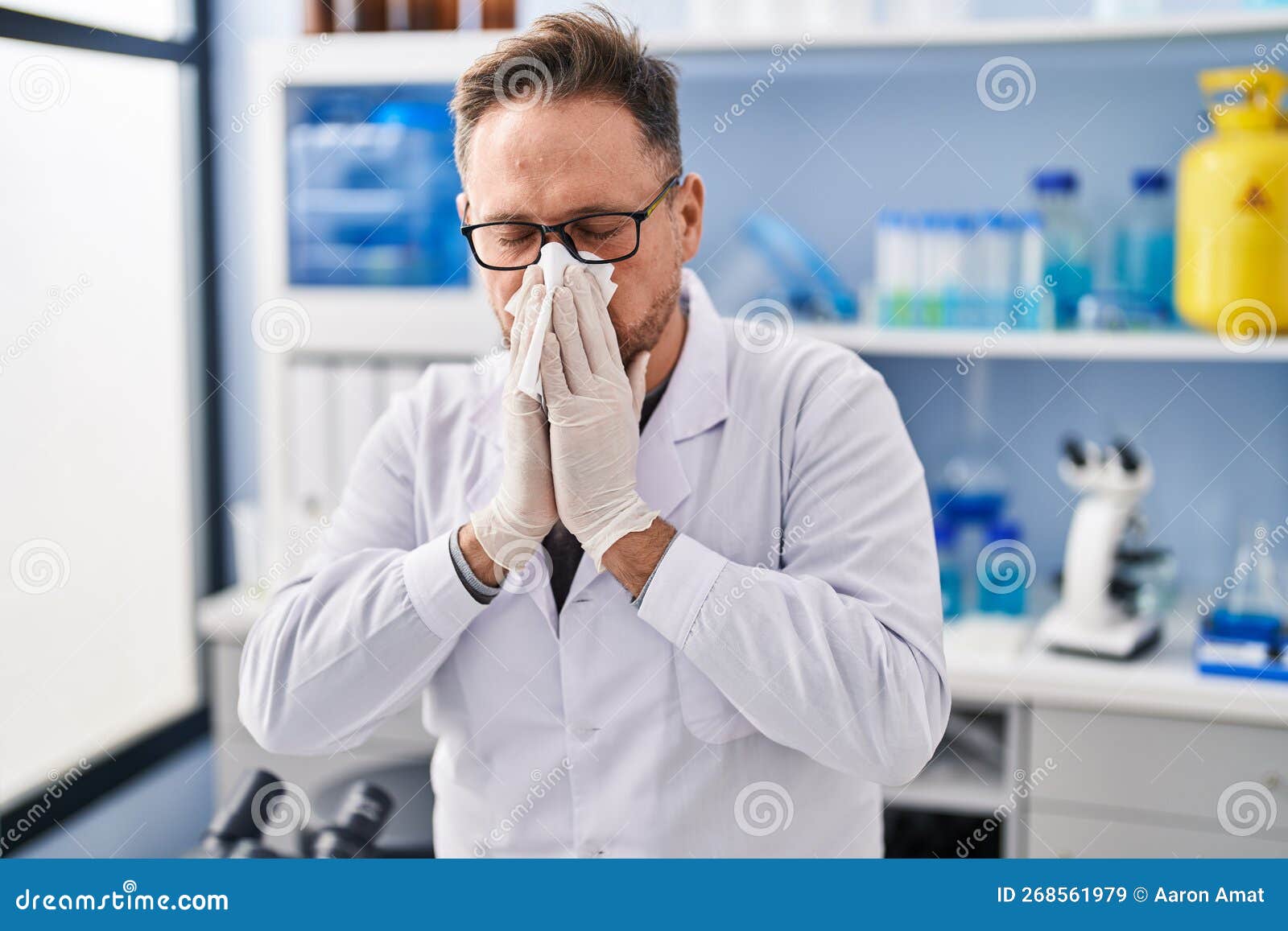 Young Caucasian Man Scientist Using Napkin at Laboratory Stock Image ...