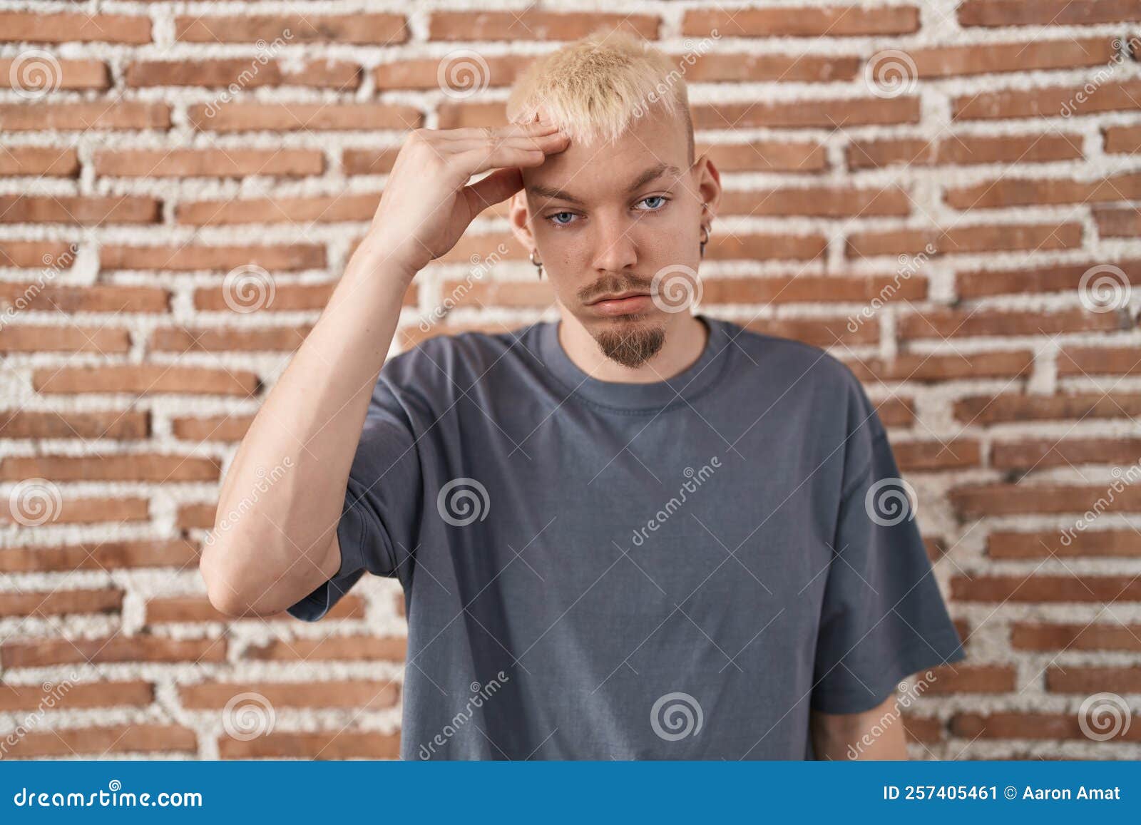 Young Caucasian Man Standing Over Bricks Wall Worried and Stressed ...