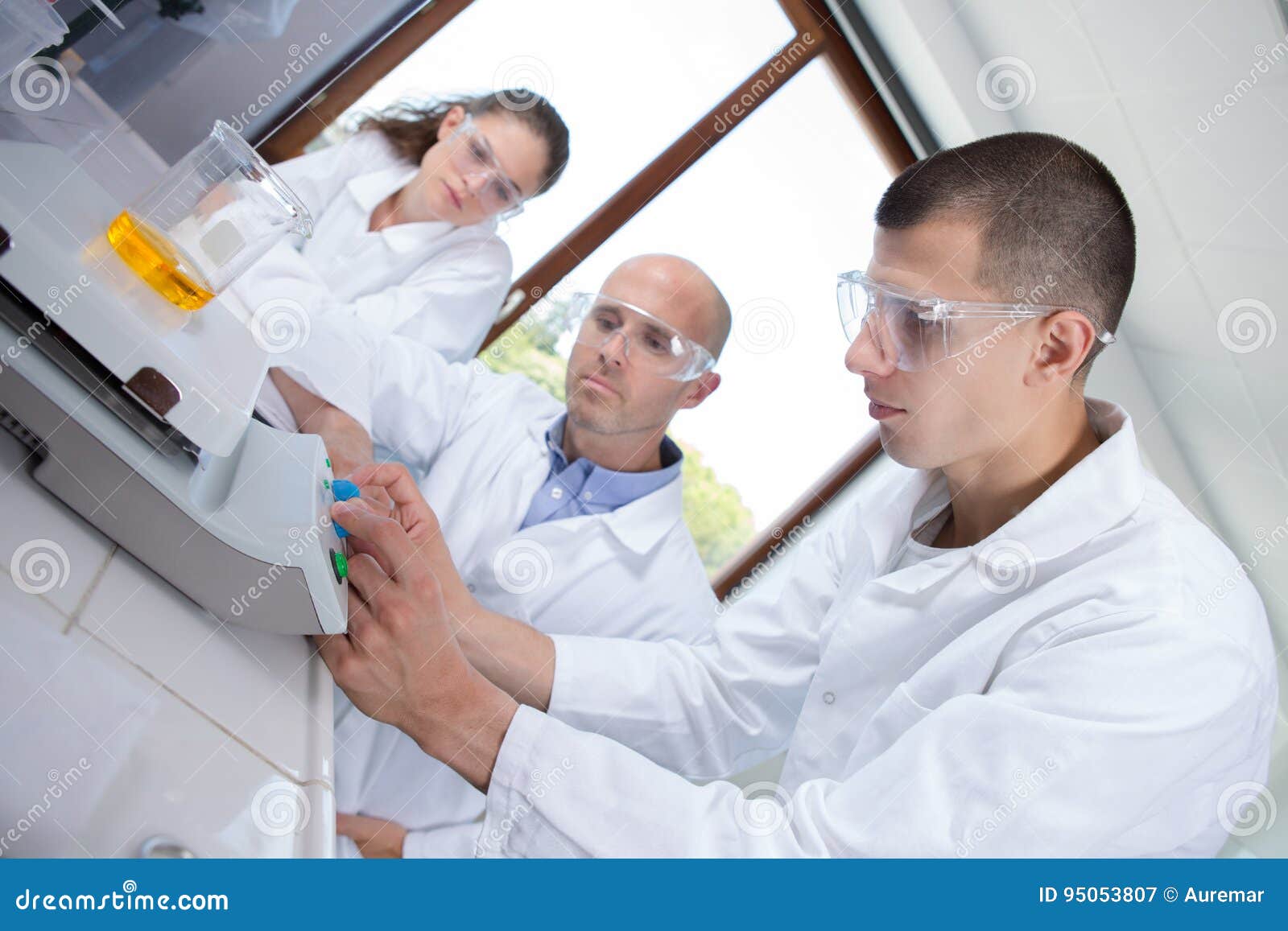 Young Caucasian Scientists Studying Molecular Structure in Laboratory ...