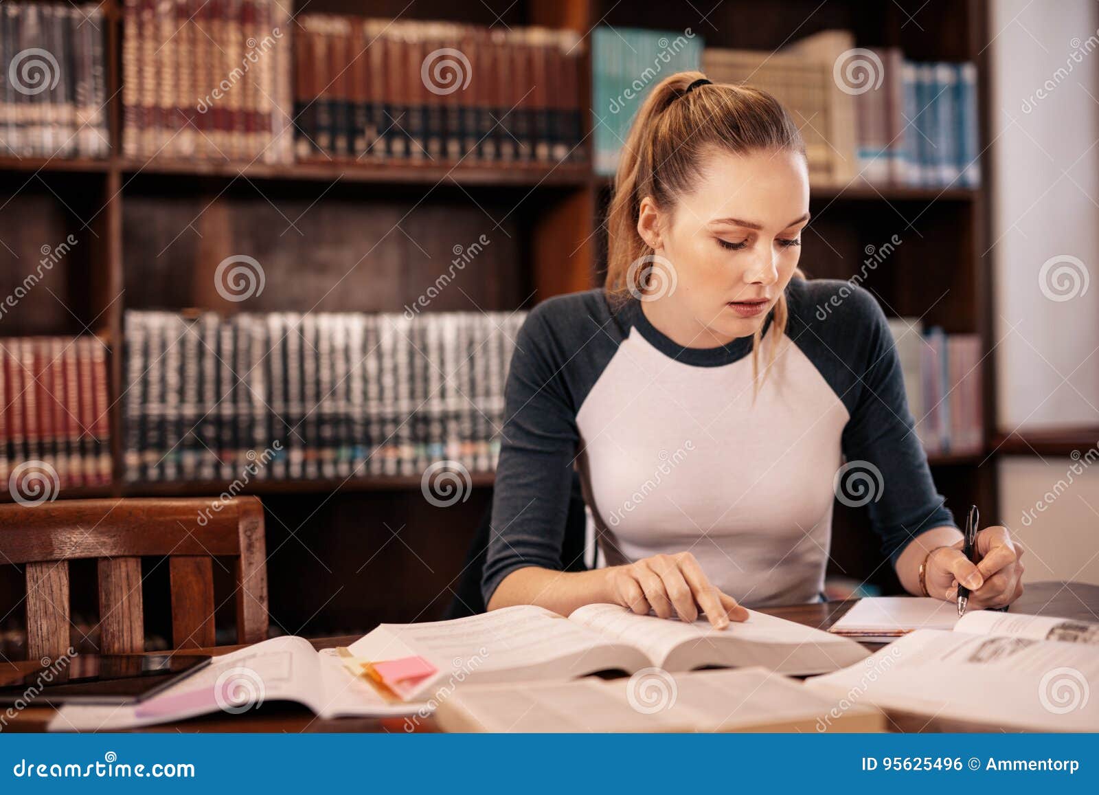 Young Caucasian Student Doing Assignments Stock Photo - Image of exam ...