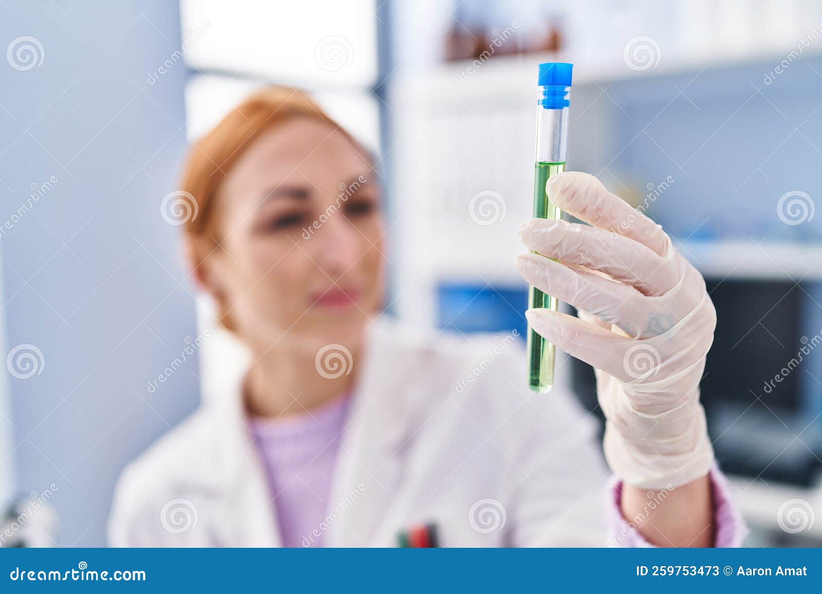 Young Caucasian Woman Scientist Measuring Liquid at Laboratory Stock ...