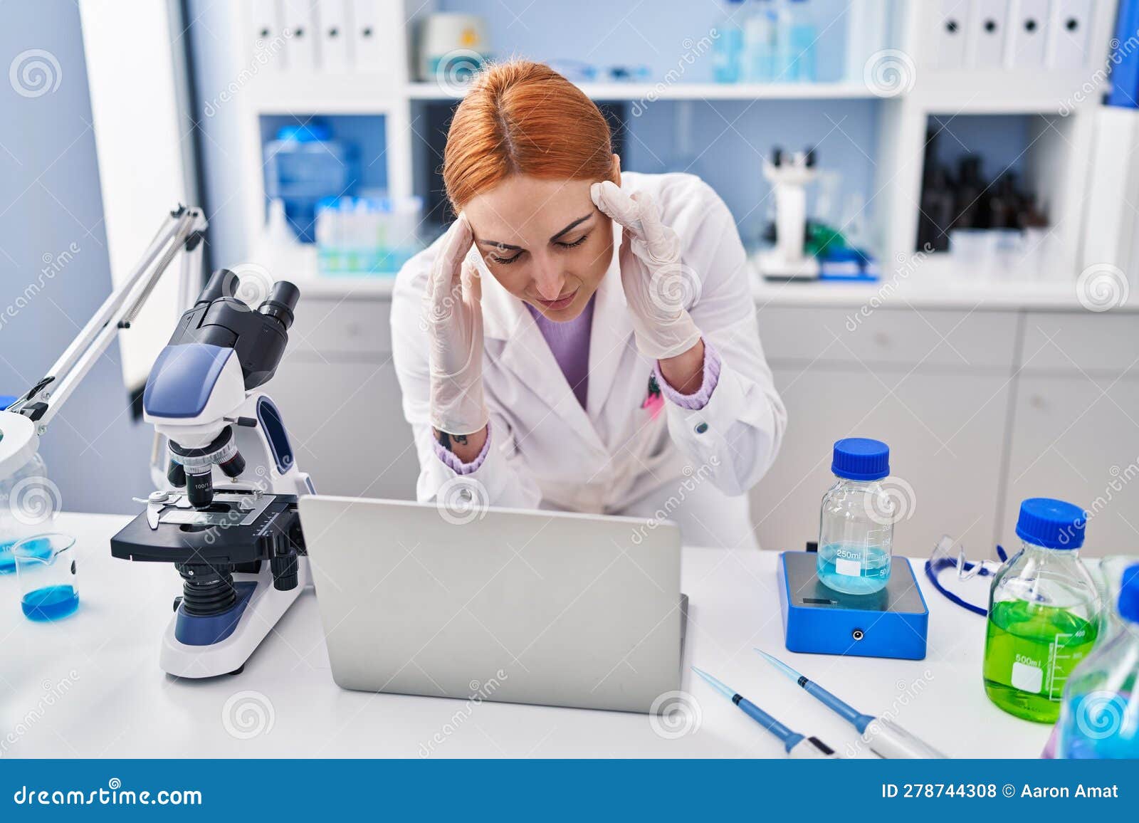 Young Caucasian Woman Scientist Stressed Using Laptop Working at ...