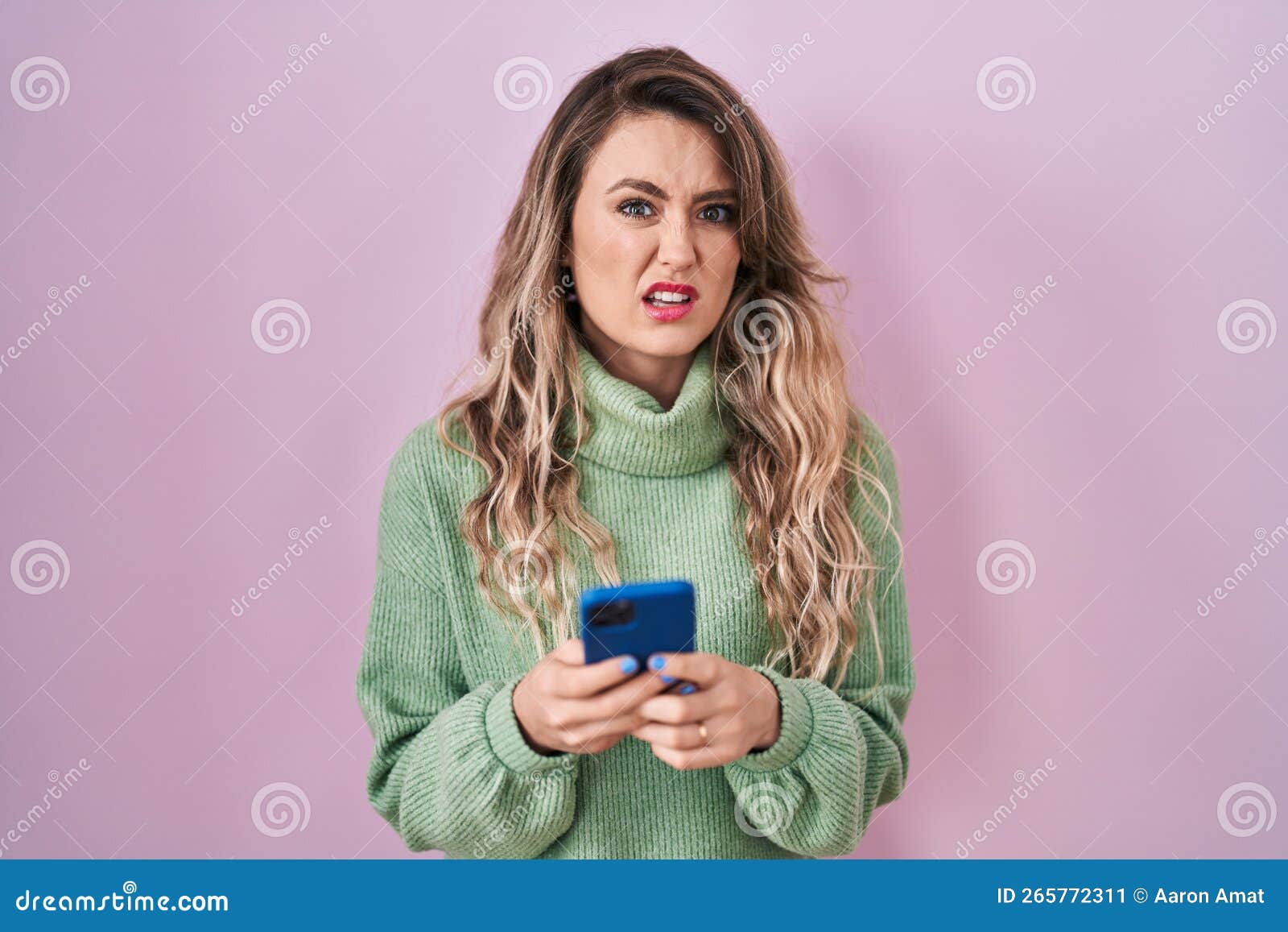 Young Caucasian Woman Using Smartphone Typing Message Clueless and ...