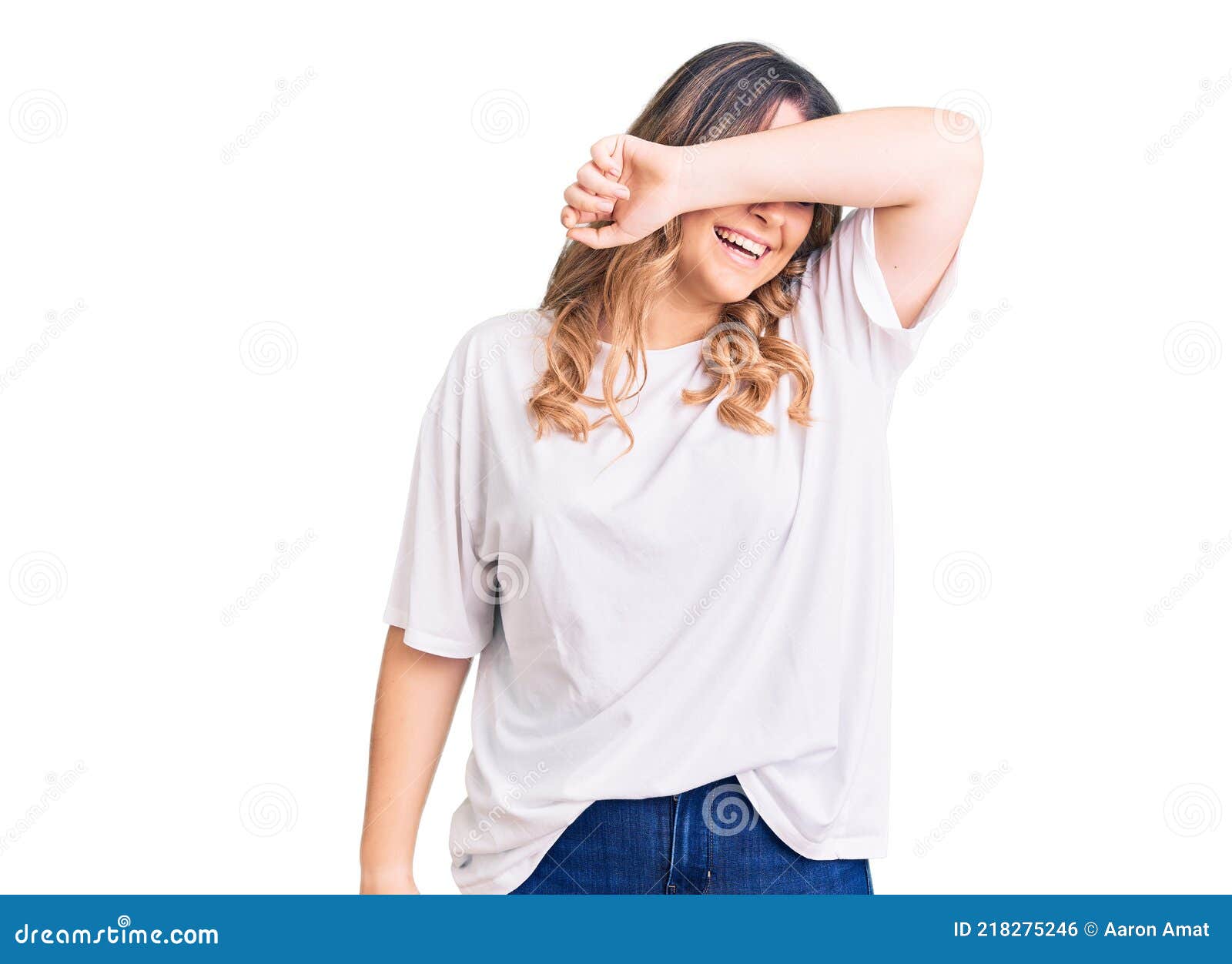 Young Caucasian Woman Wearing Casual Clothes Covering Eyes With Arm