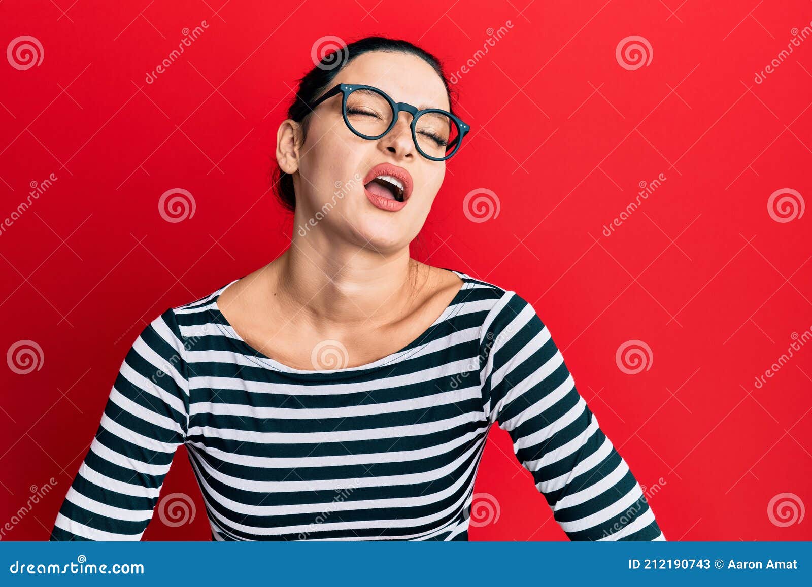 Young Caucasian Woman Wearing Casual Clothes And Glasses With Hand On