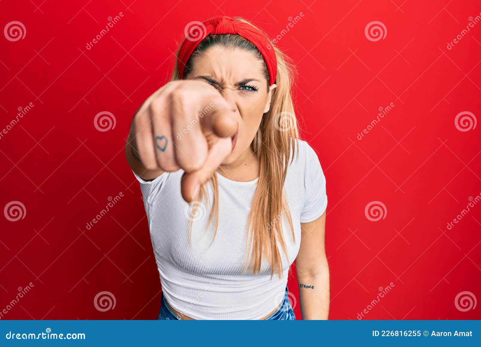 Young Caucasian Woman Wearing Casual White T Shirt Pointing Displeased