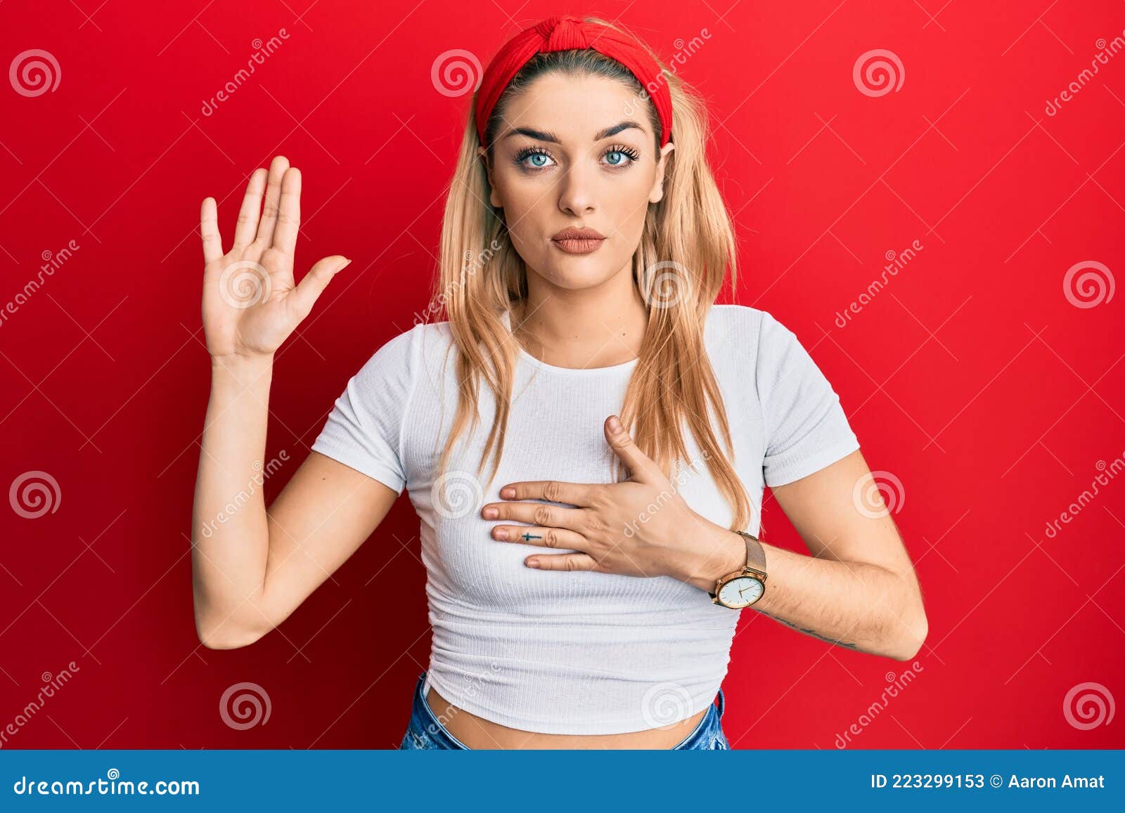 Young Caucasian Woman Wearing Casual White T Shirt Swearing With Hand