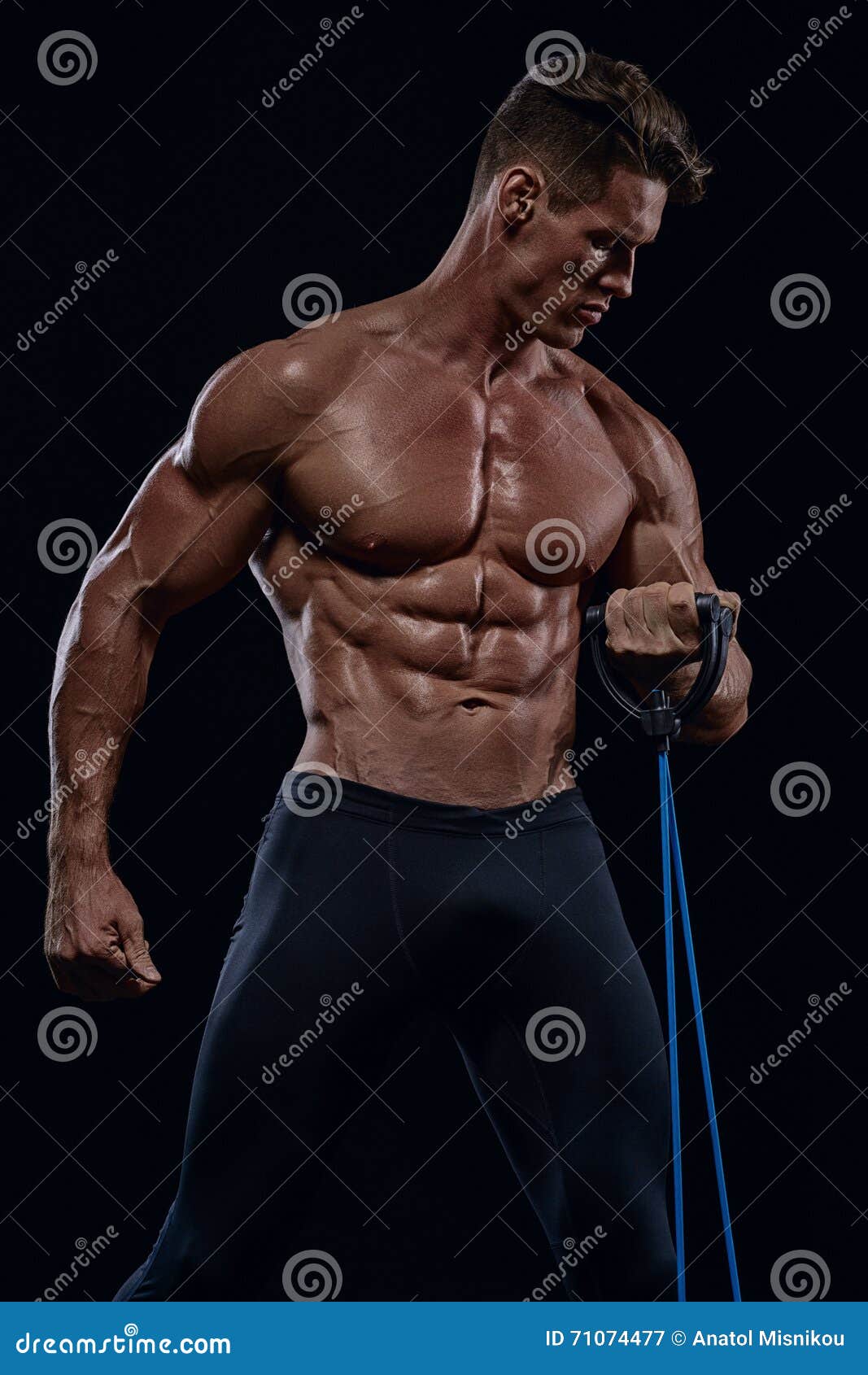 Young Charismatic Bodybuilder Exercise on Muscles Drying Stock Image ...