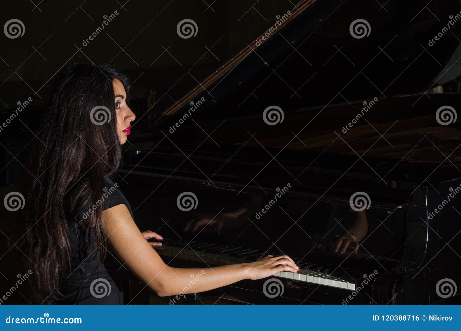 Young Charming Brunette Girl Playing the Piano Stock Photo - Image of ...
