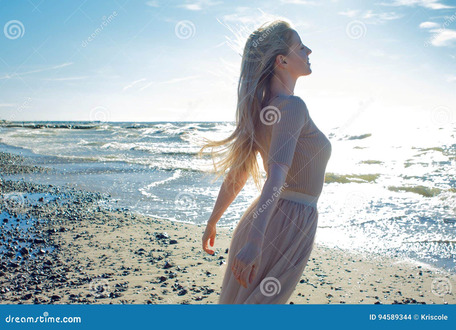 Young Cheerful Girl On The Seashore Young Blonde Woman Smiling Open