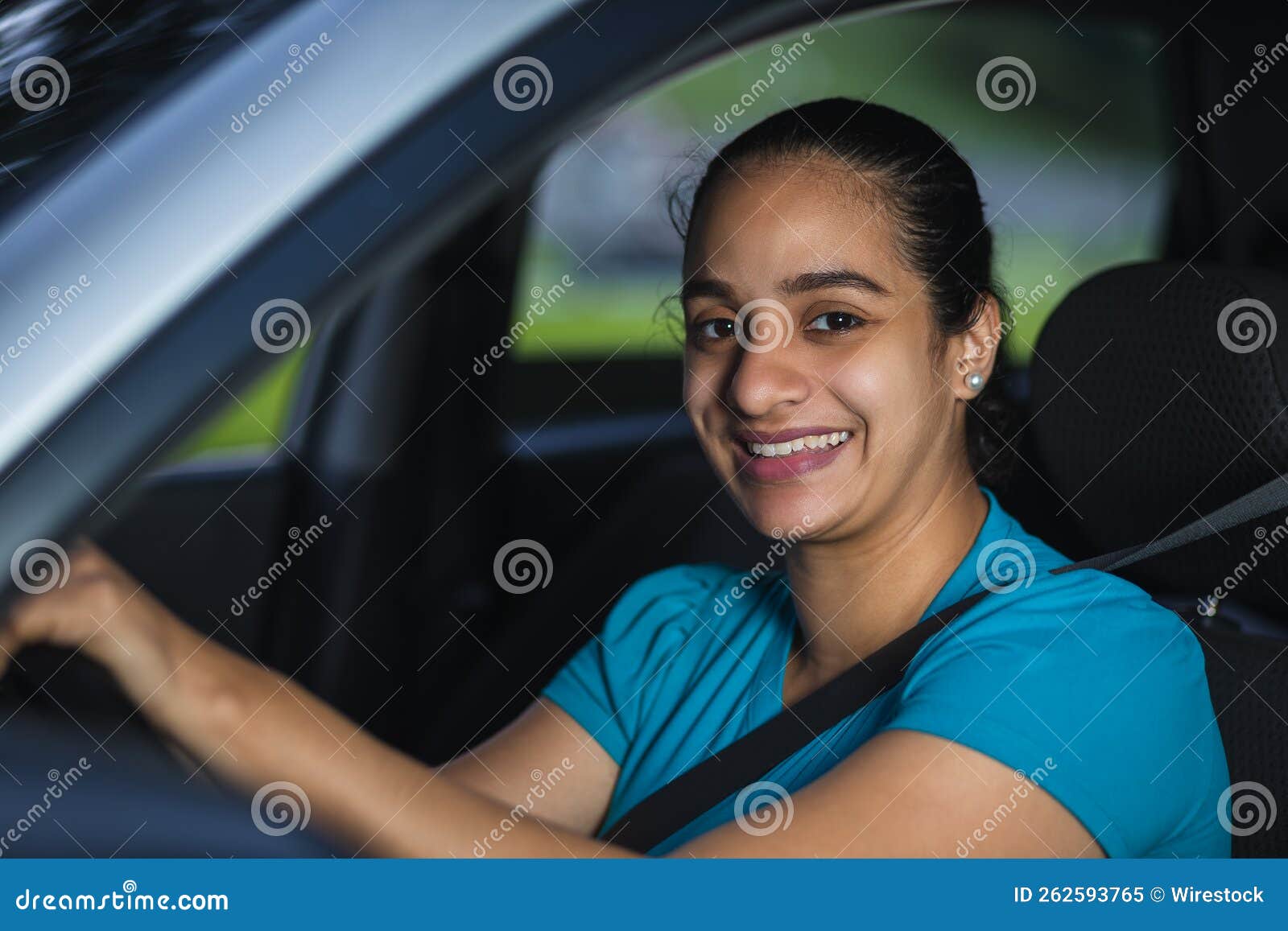 Young Cheerful Hispanic Female Driving Her Car Stock Image - Image of ...