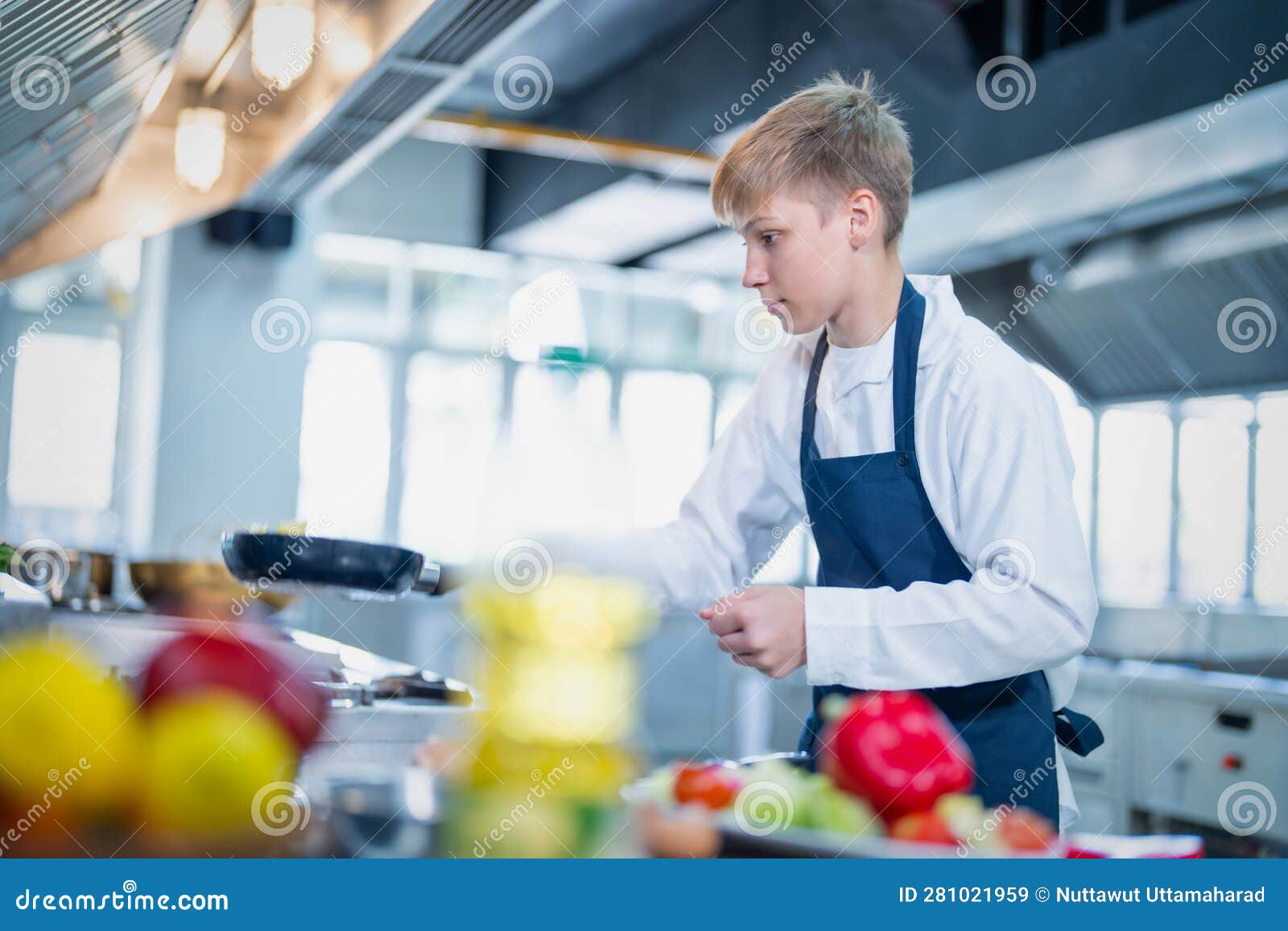 Young Chef Cooking at Restaurant Kitchen Stock Image - Image of ...