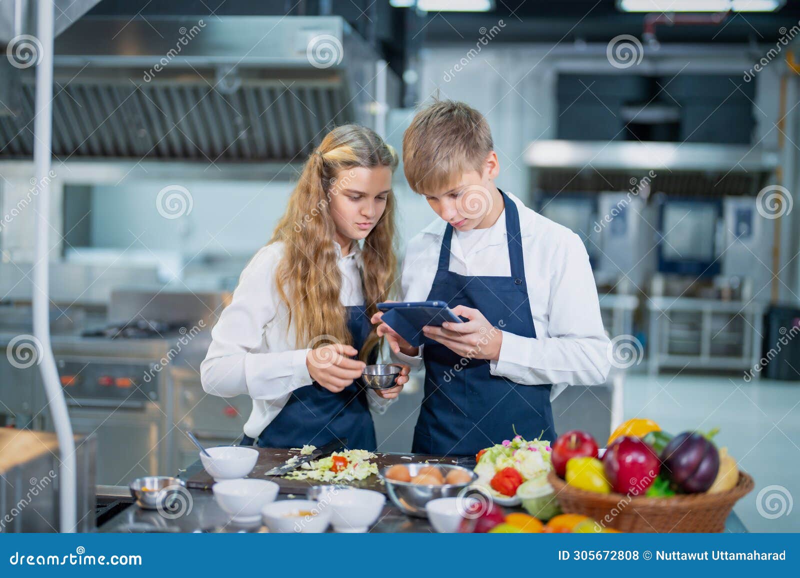 Young Chef Cooking at Restaurant Kitchen Stock Photo - Image of ...