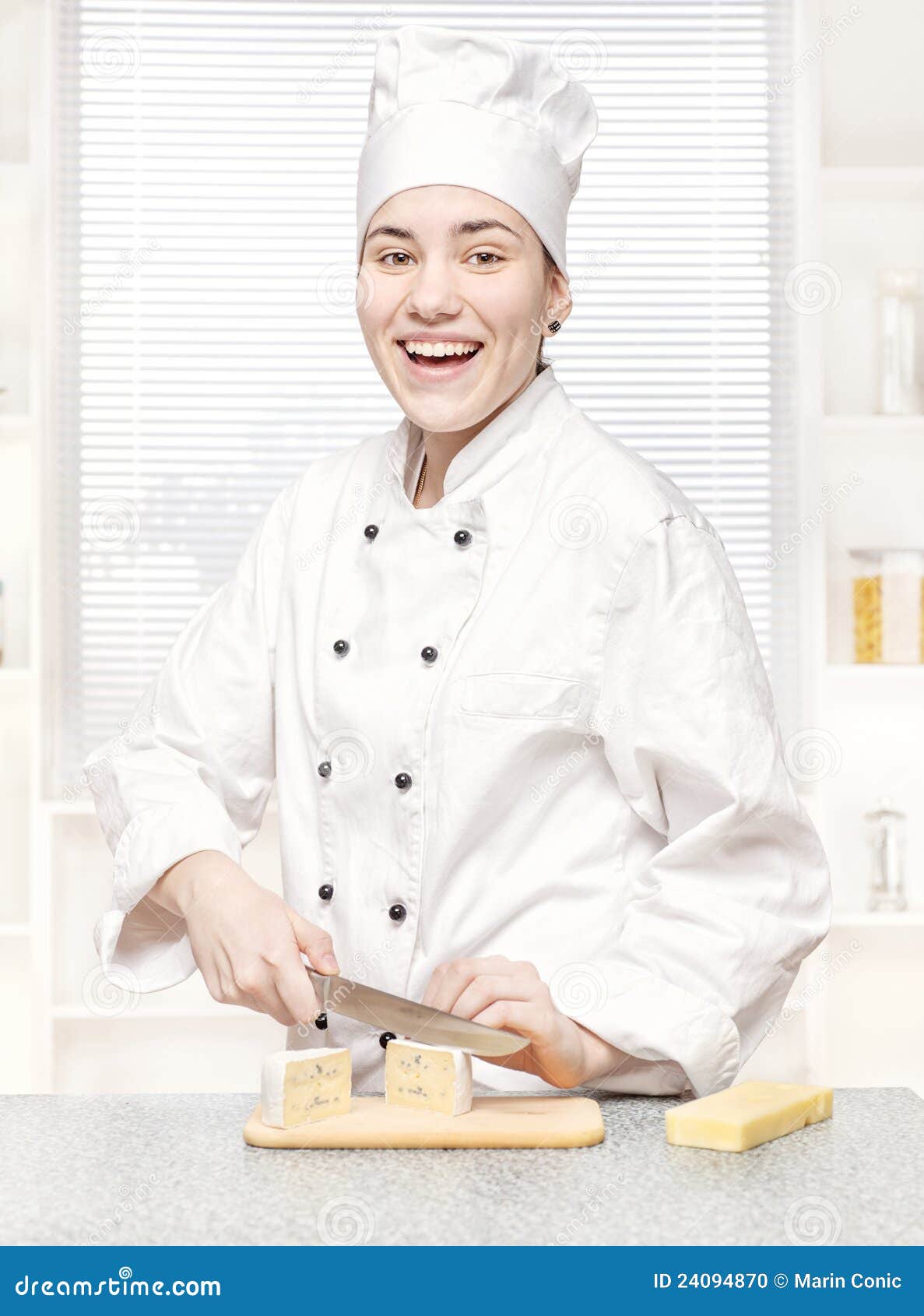 Young Chef Cutting Blue Cheese in Kitchenn Stock Photo - Image of ...