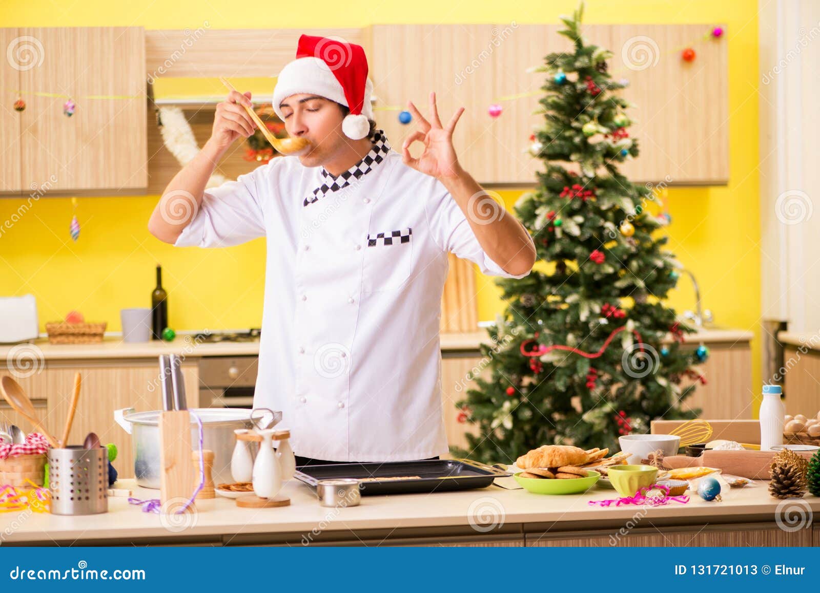 The Young Chef Husband Working in Kitchen at Christmas Eve Stock Image ...