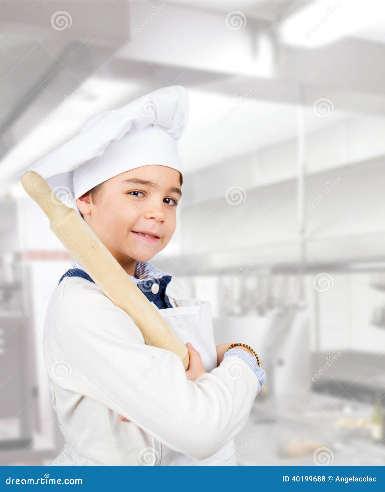 Young chef in the kitchen stock photo. Image of person - 40199688