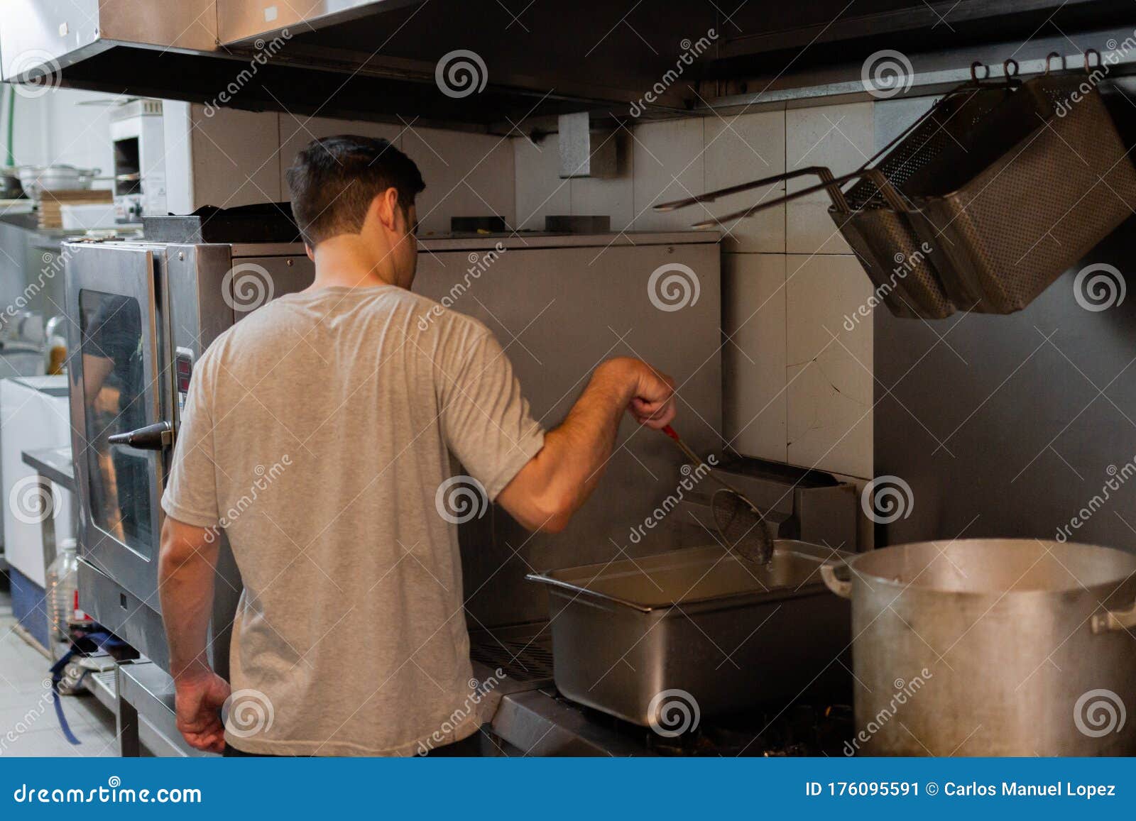 Young Chef Making Food Production for Restaurant Kitchen Stock Image ...