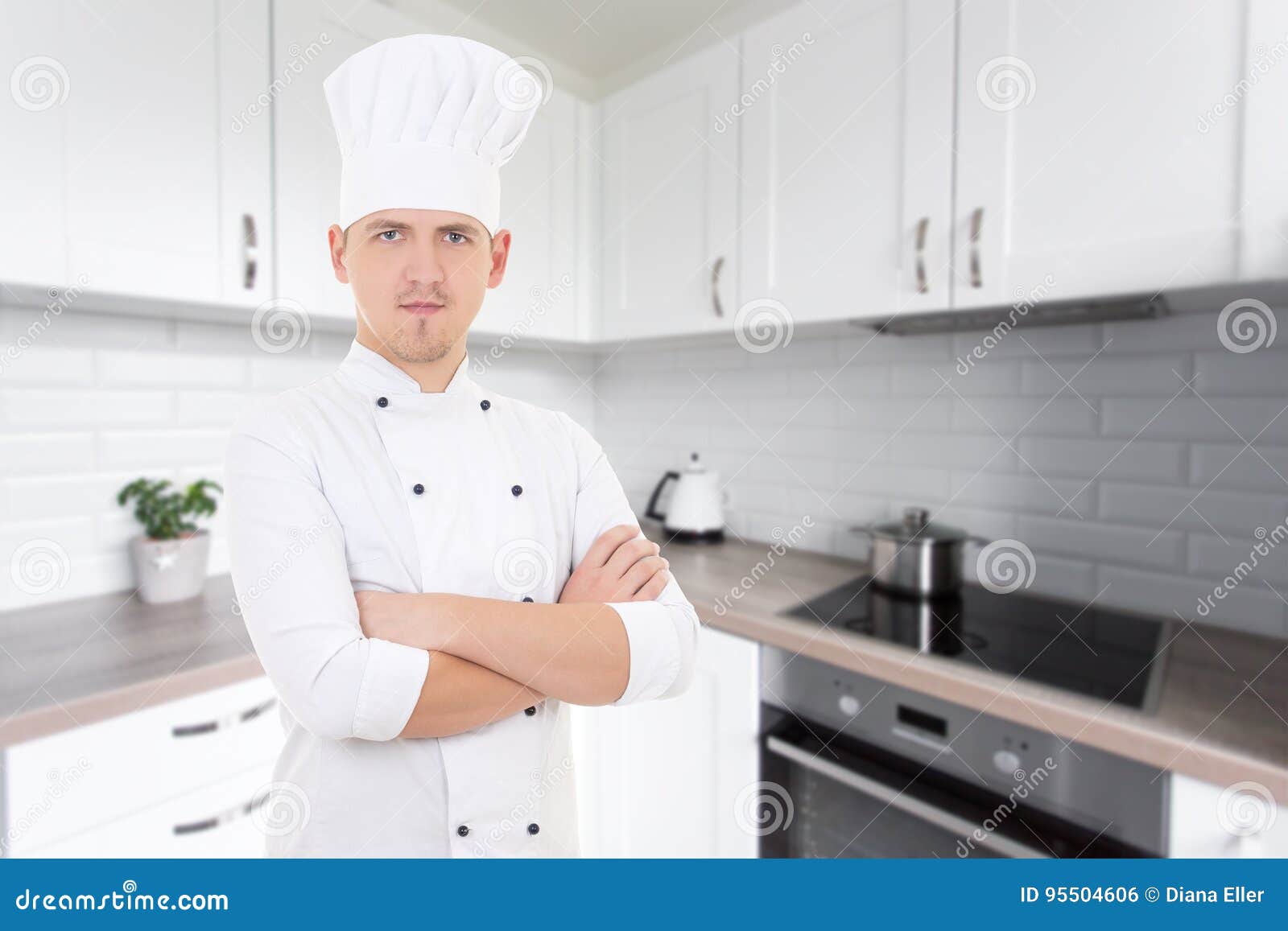 Young Chef Man in Uniform Posing in Modern Kitchen Stock Photo - Image ...