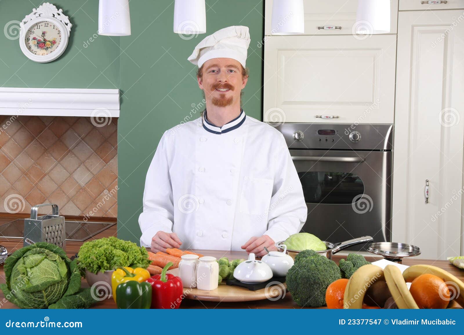 Young chef preparing lunch stock image. Image of cook - 23377547