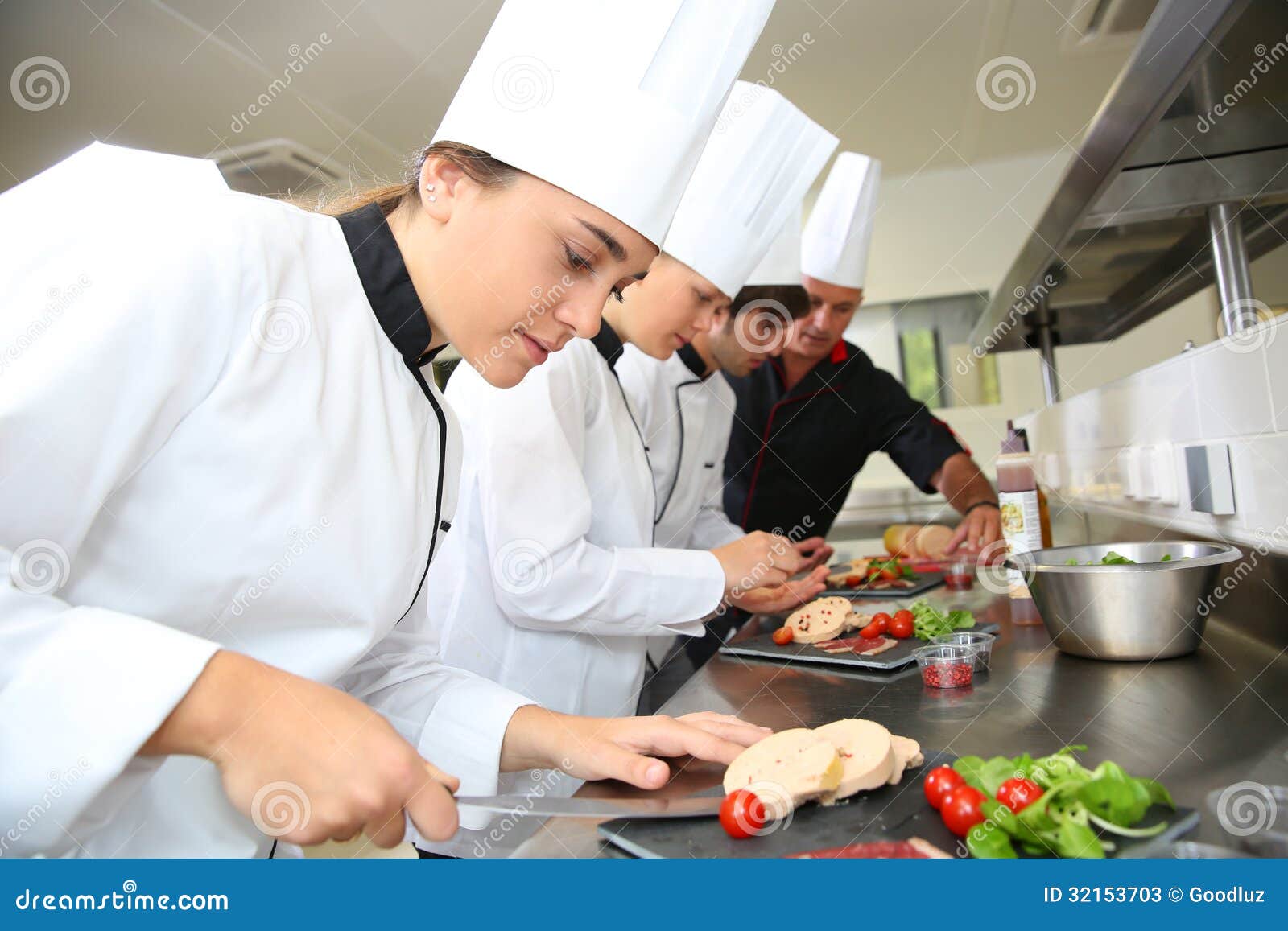 Young Chefs Preparing Delicatessen Stock Image - Image of kitchen ...