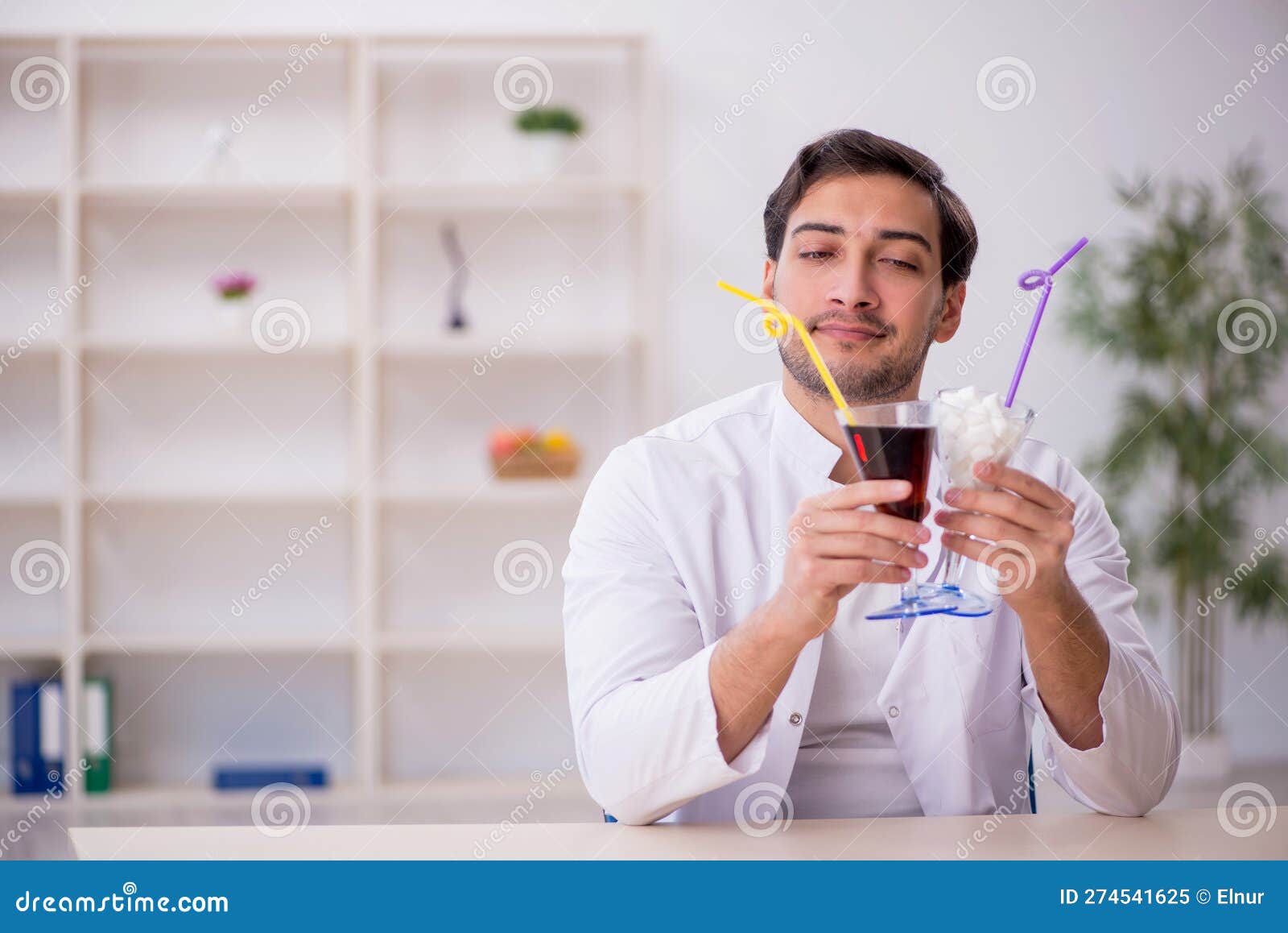 Young Male Chemist Examining Soft Drink at the Lab Stock Image - Image ...