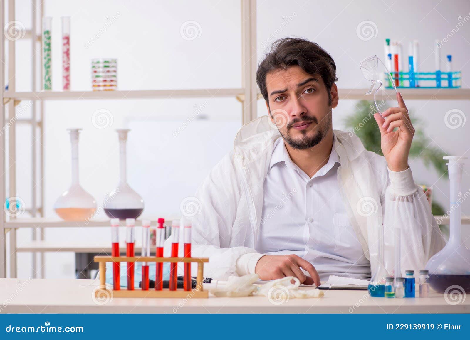 Young Male Chemist Extremely Tired at the Lab Stock Image - Image of ...