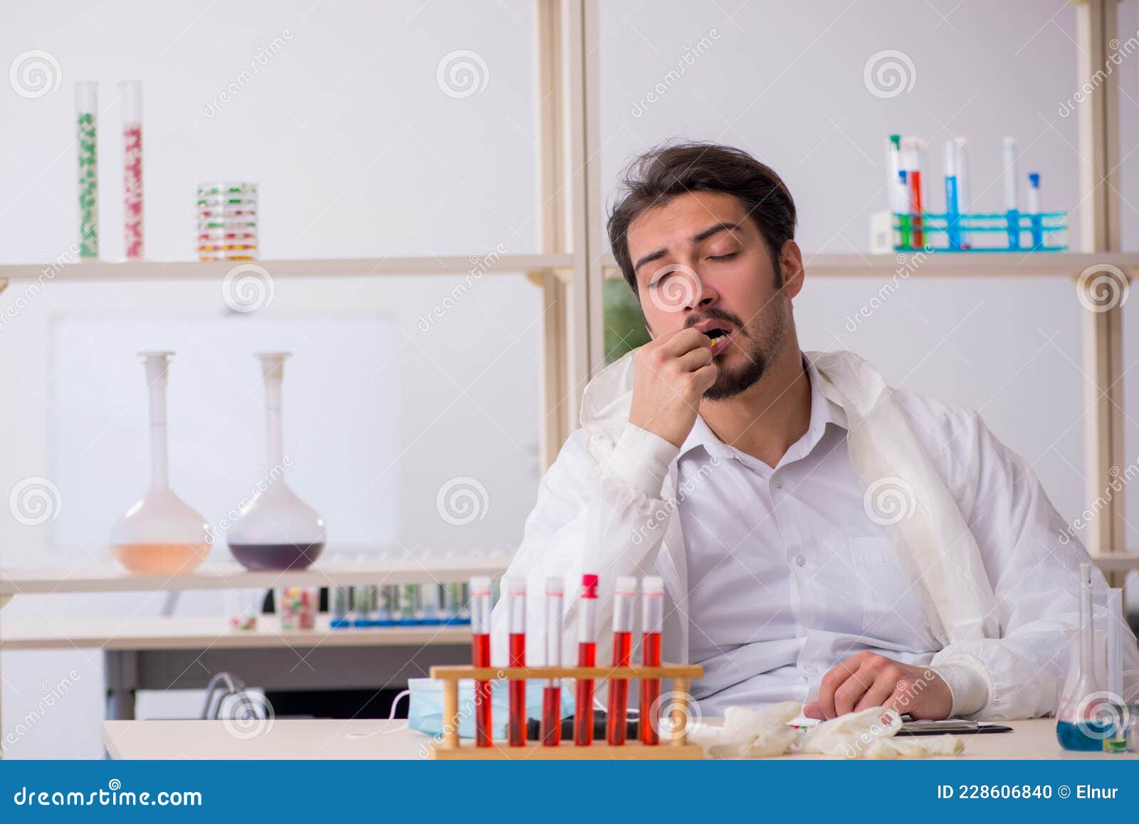 Young Male Chemist Extremely Tired at the Lab Stock Photo - Image of ...