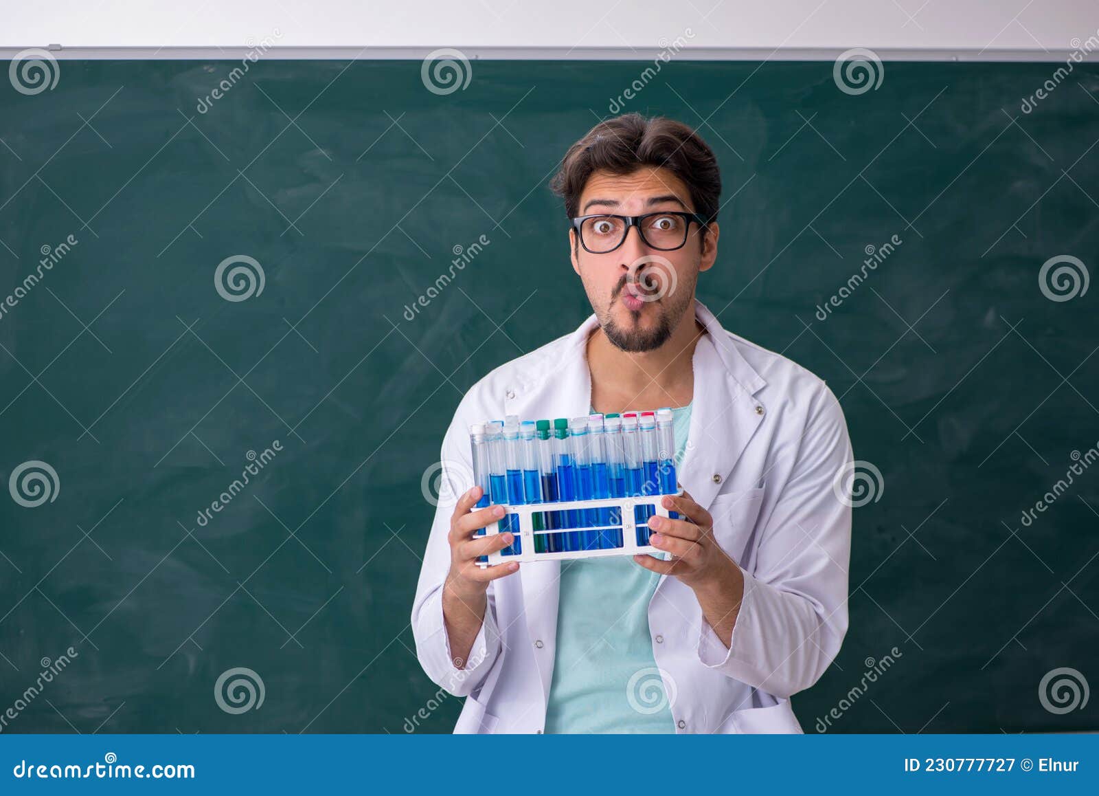 Young Male Chemist in Front of Blackboard Stock Image - Image of ...
