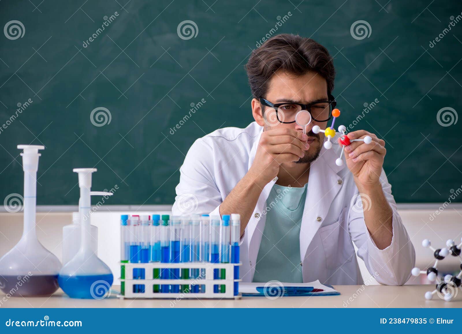 Young Male Chemist in Front of Blackboard Stock Image - Image of ...