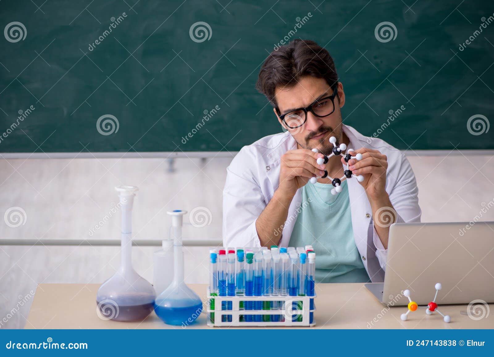 Young Male Chemist in Front of Blackboard Stock Photo - Image of ...