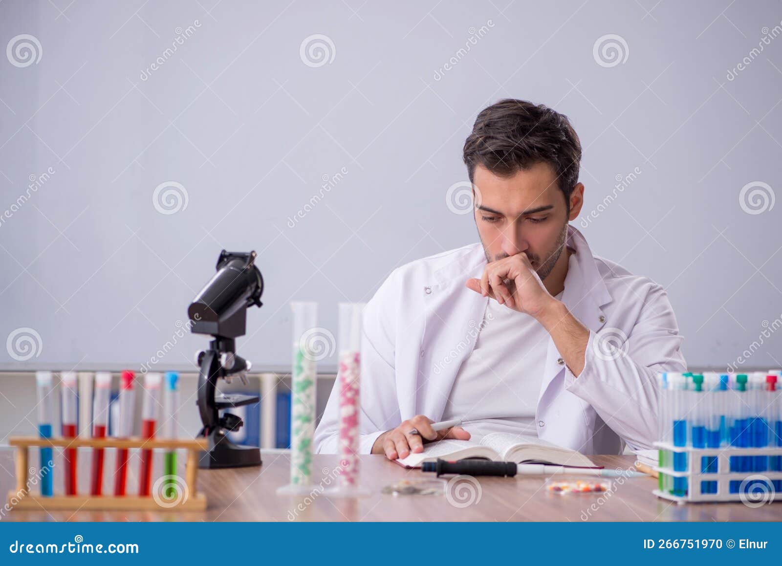 Young Male Chemist in Front of White Board Stock Photo - Image of ...
