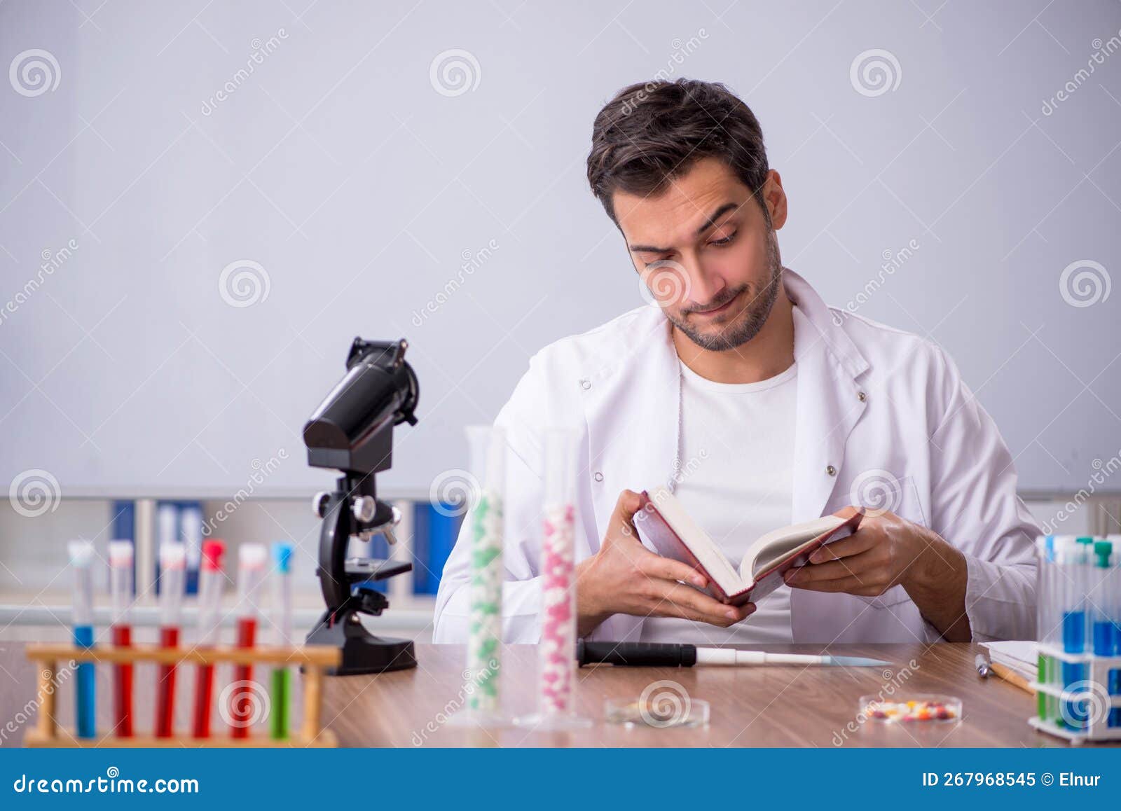 Young Male Chemist in Front of White Board Stock Image - Image of ...